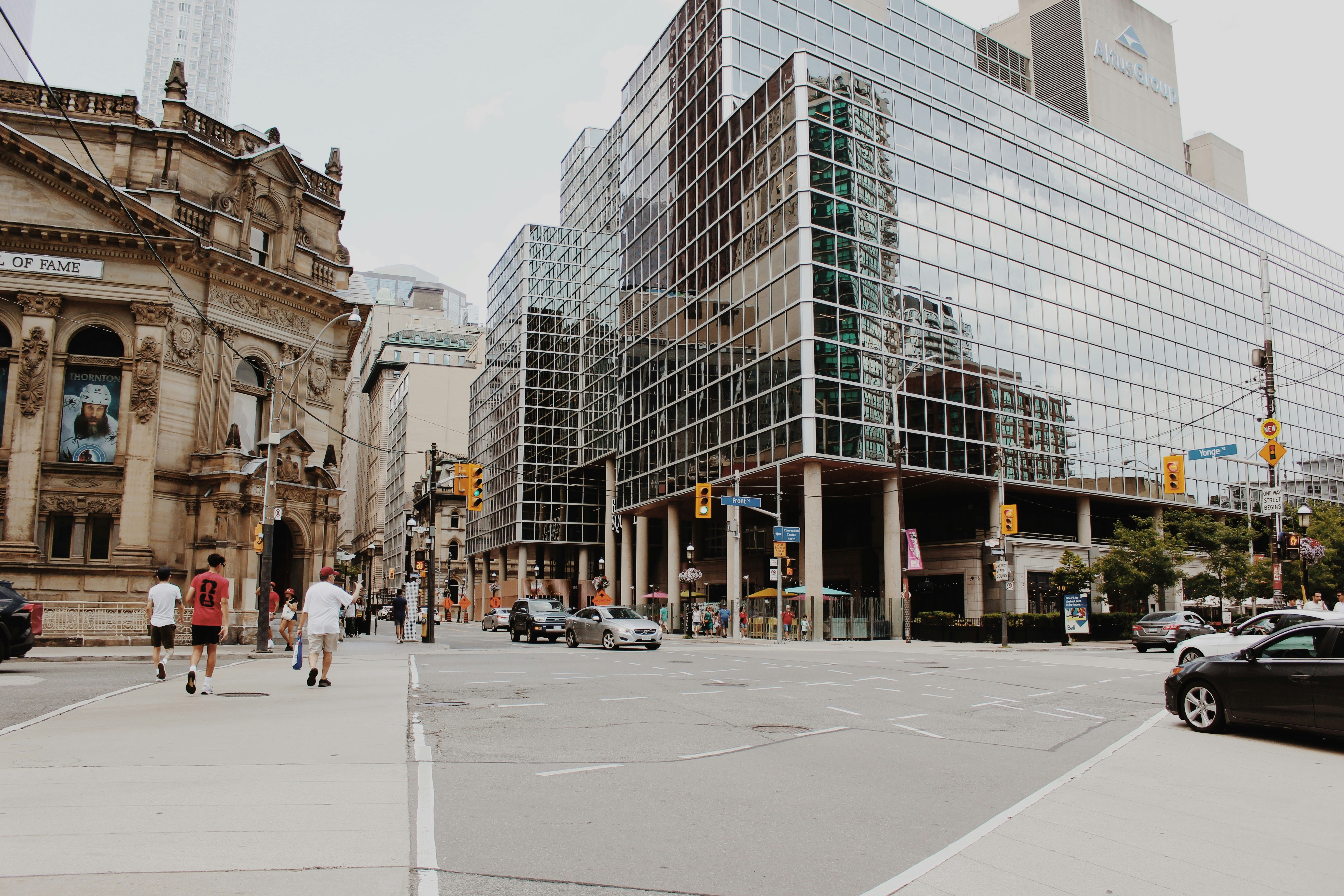Urban Confluence: Pedestrians Crossing a Glass-Fronted Core