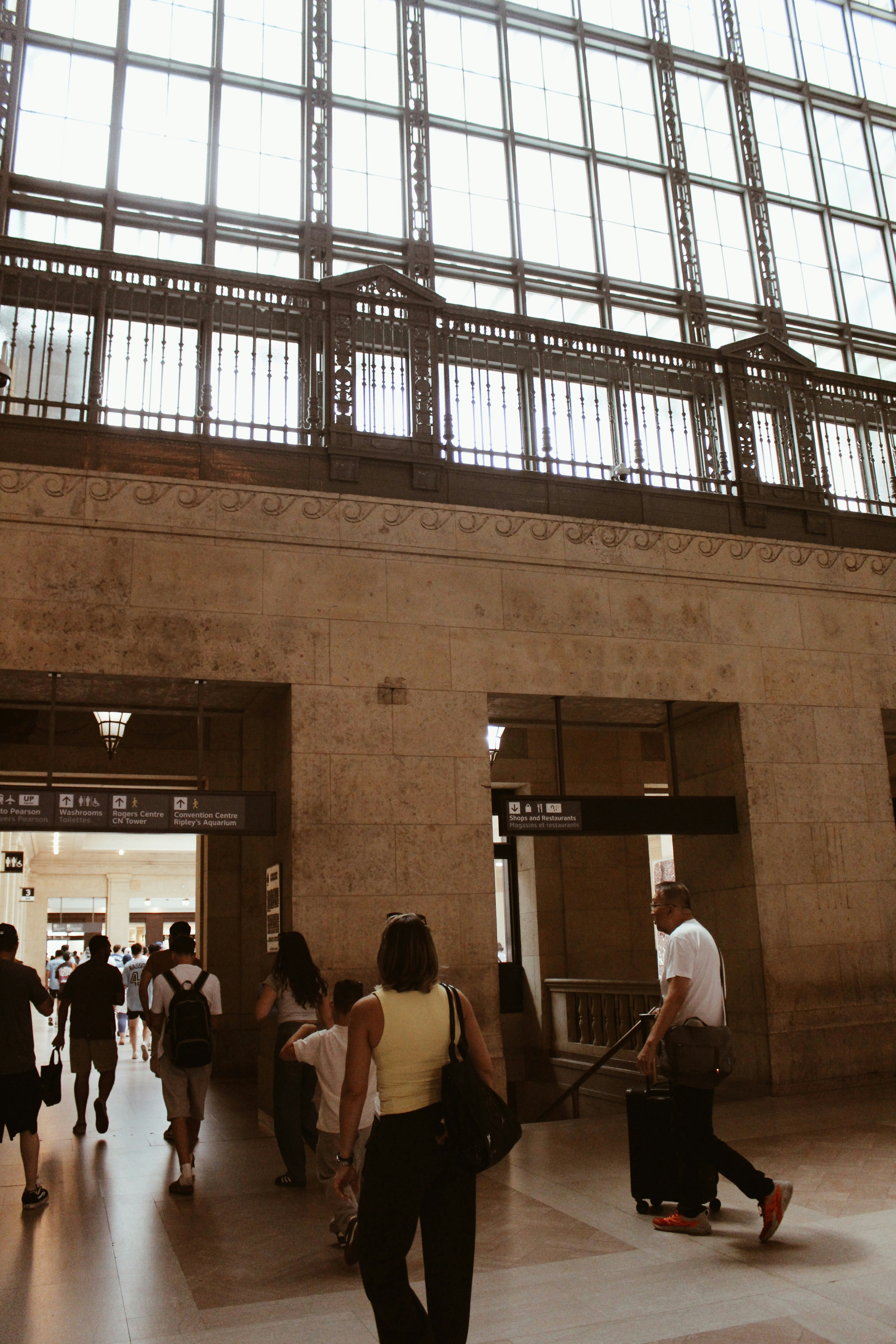 Midday Transit: Travelers Cross the Grand Hall