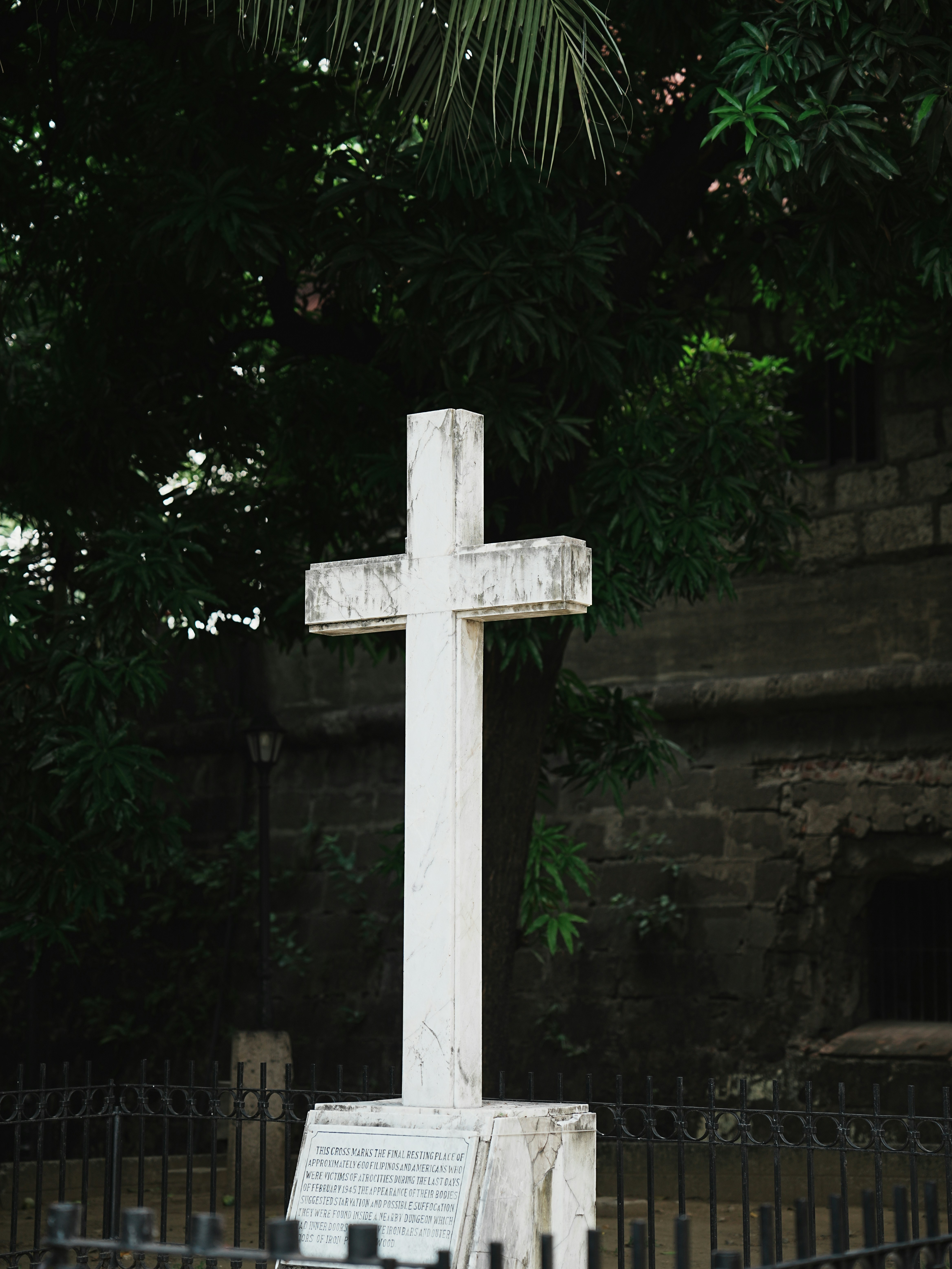 Marble Cross in Quiet Courtyard