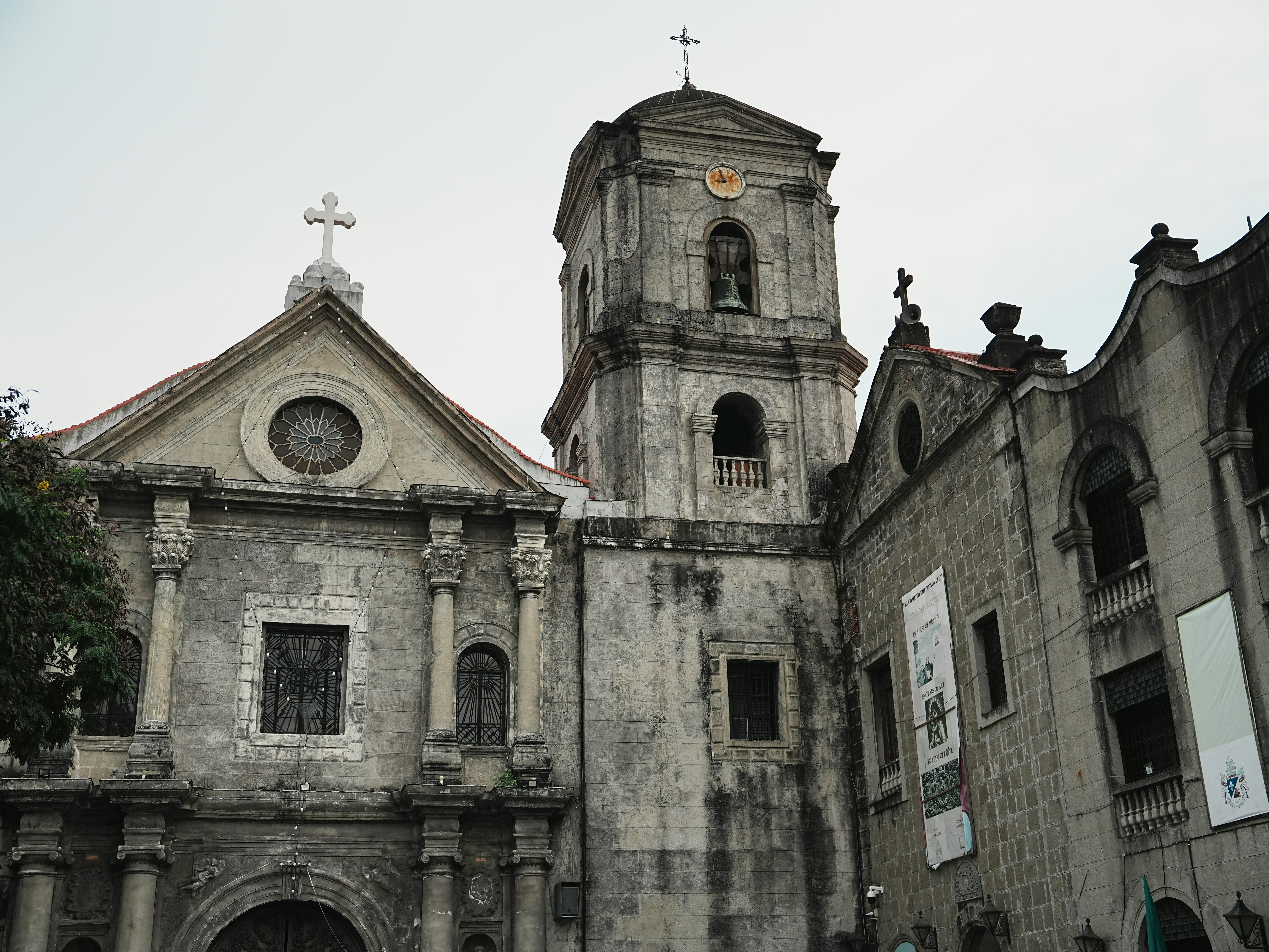 Stone Facade and Bell Tower: Timeworn Catholic Church