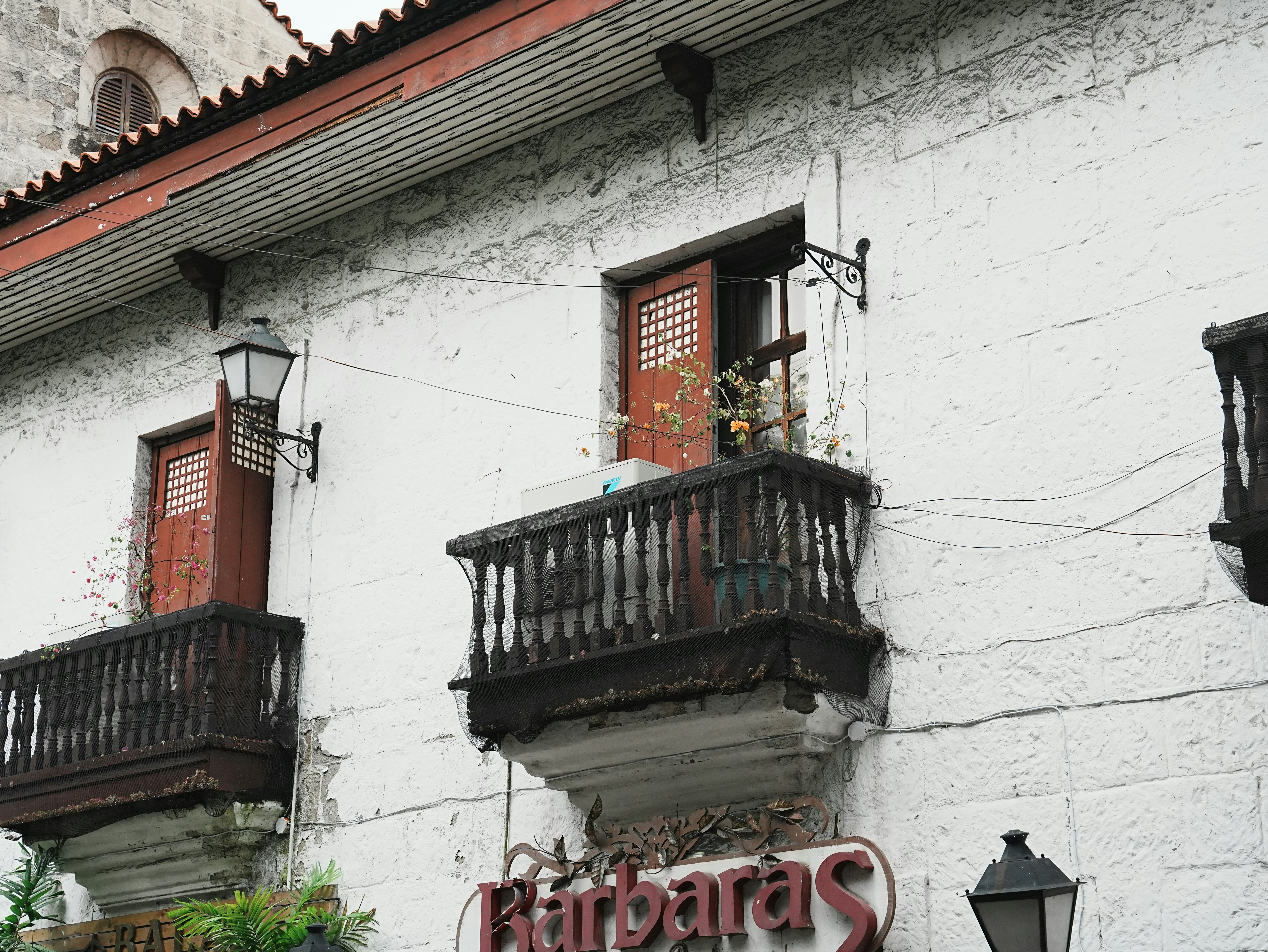 Balcony Overhang and Baroque Facade in Vintage Mexican Architecture