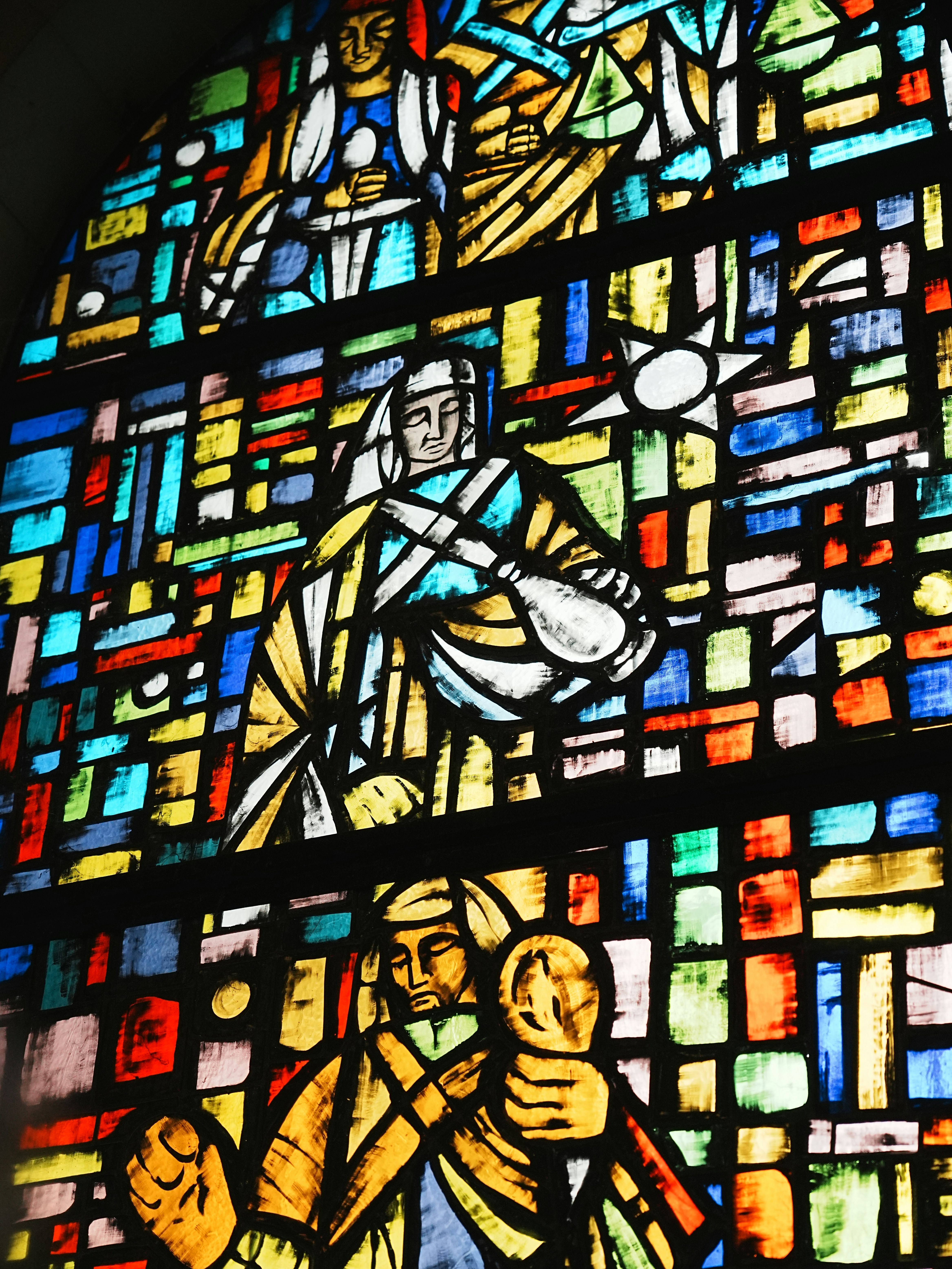Emergence of Saintly Figures Through a Mosaic of Color