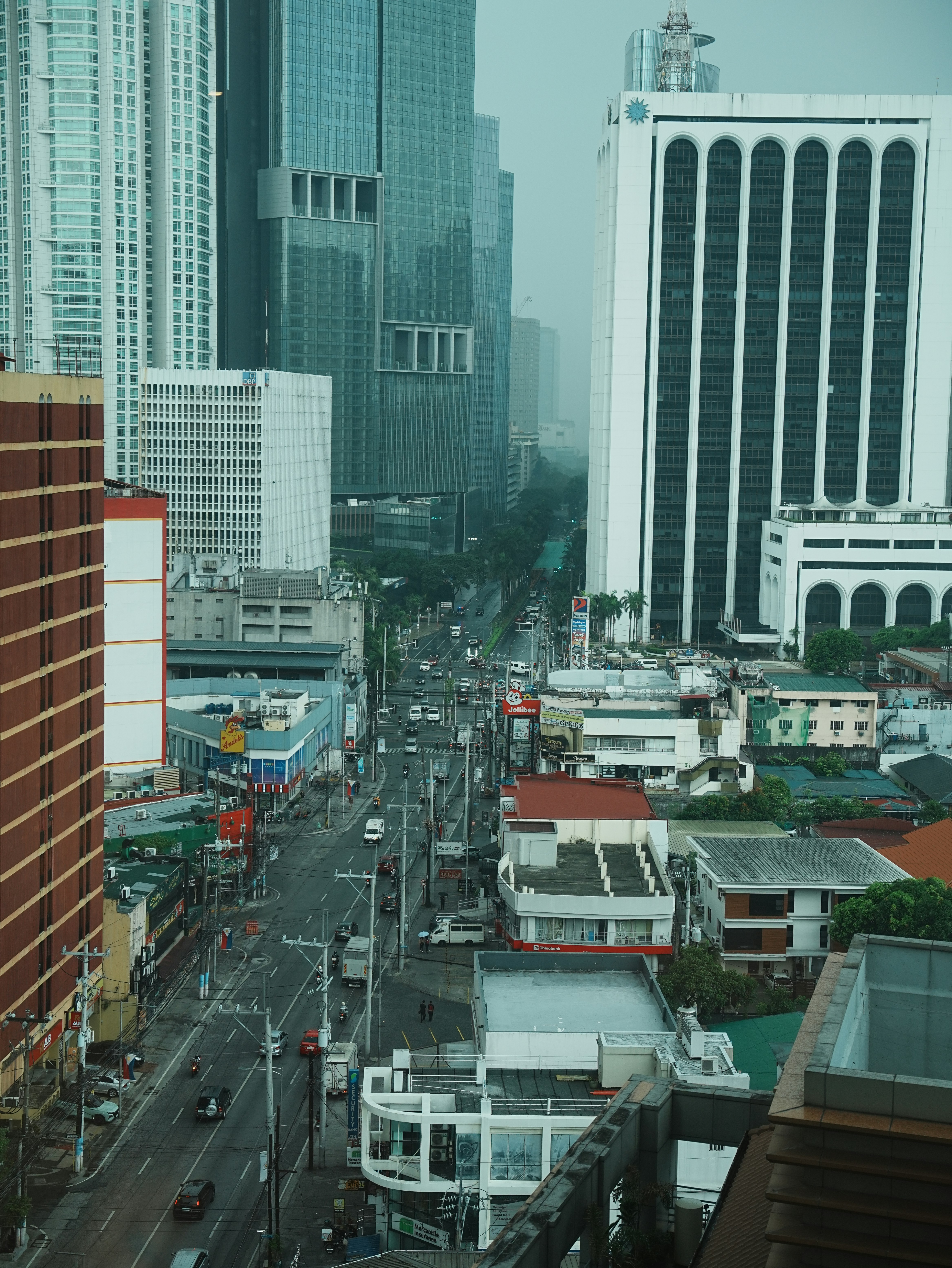 Urban Confluence: A Downward View into a Bustling Skyline Corridor