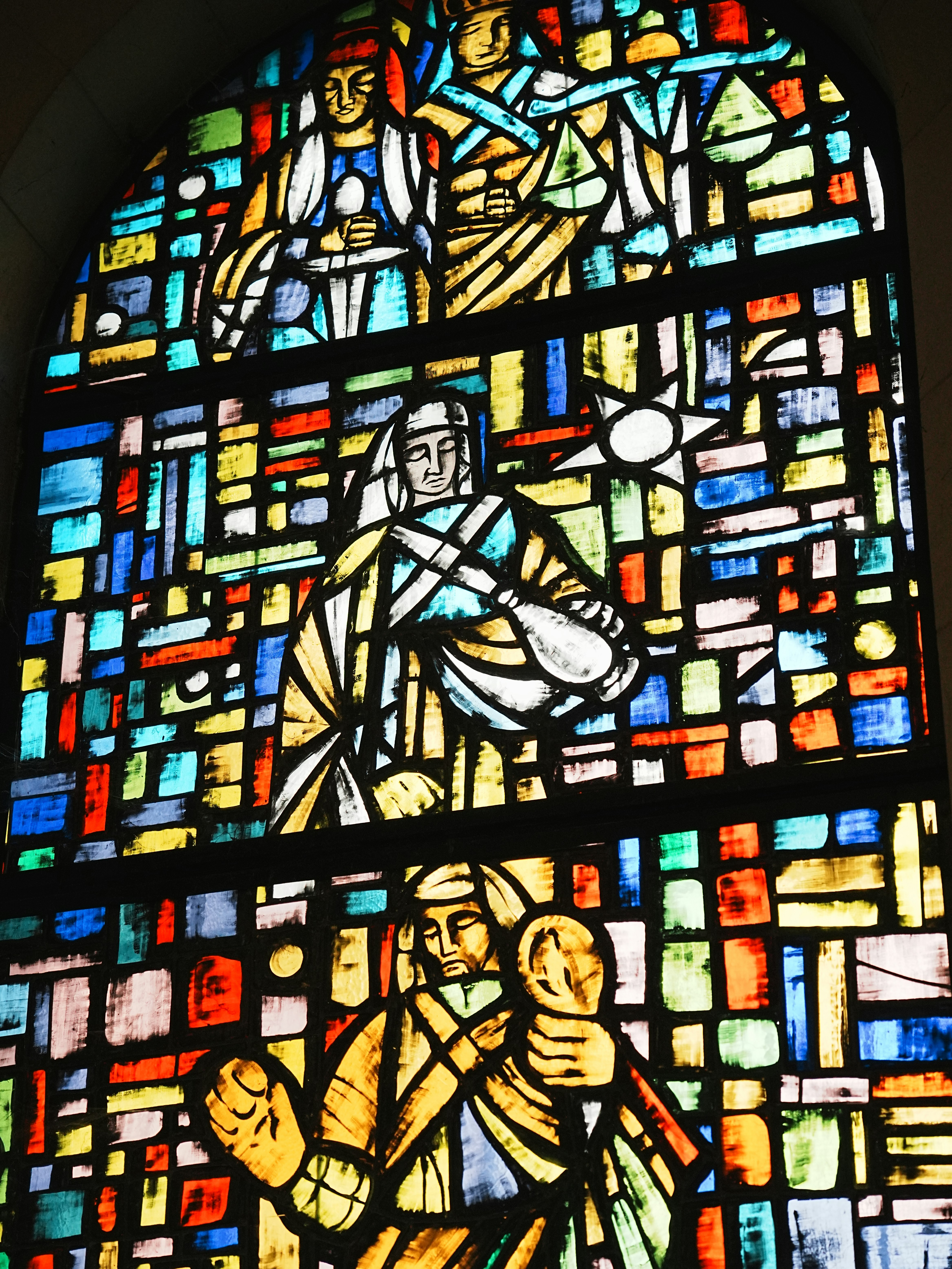 Stained Glass Covenant: A Multicolored Assembly of Figures