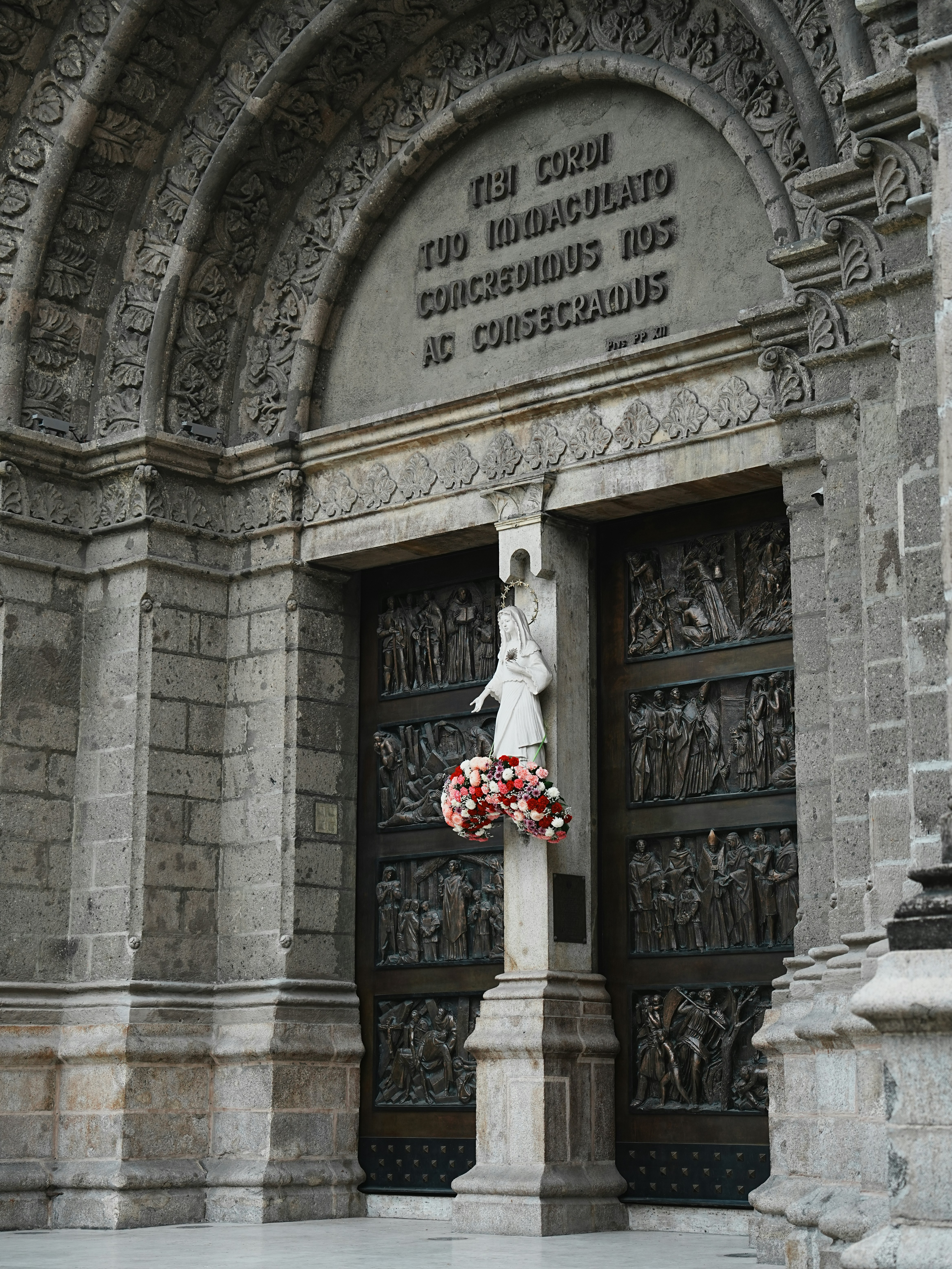 Stone Cathedral Portal with Memorial Statue Bouquet
