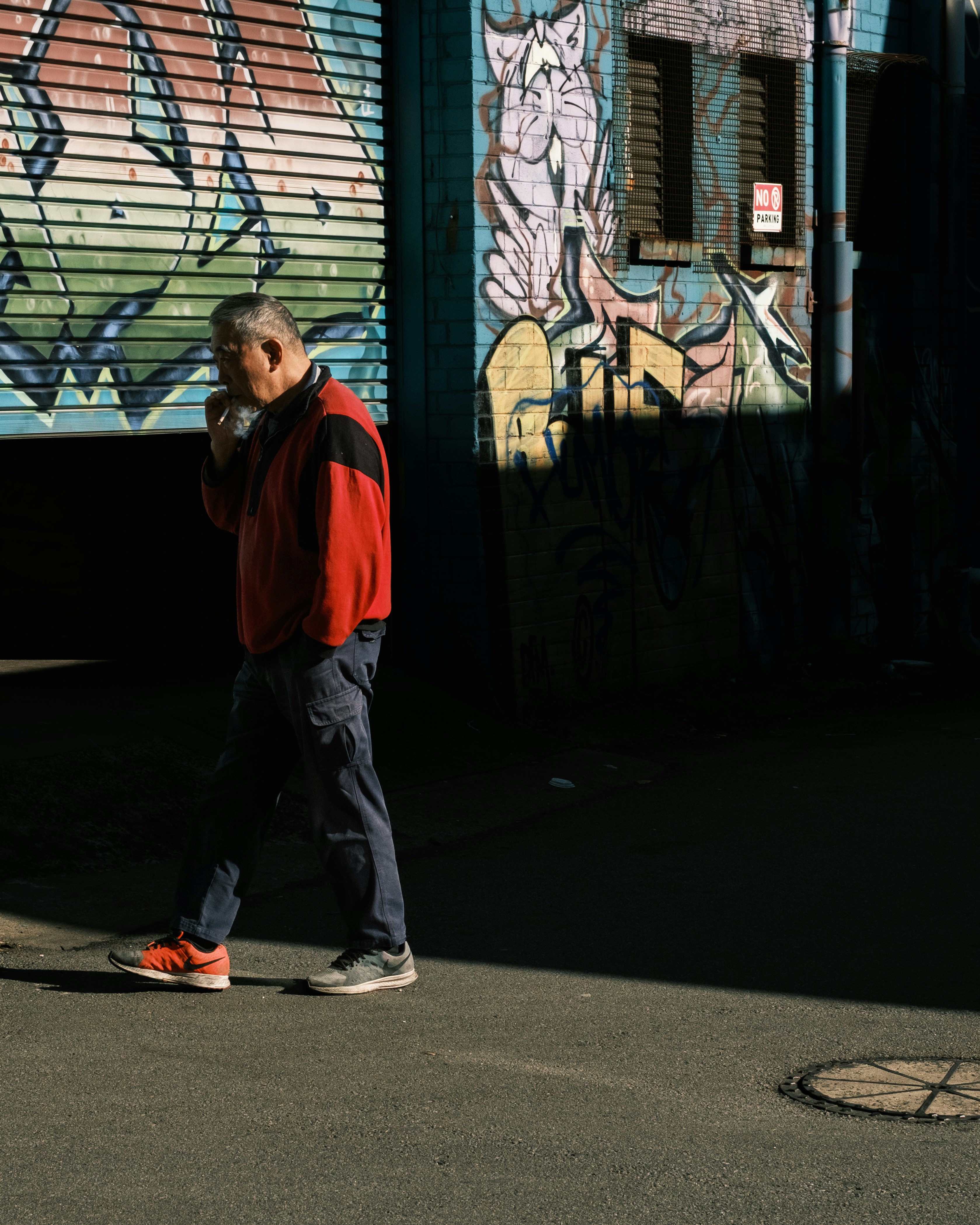 Passing Moment in Graffiti Alley