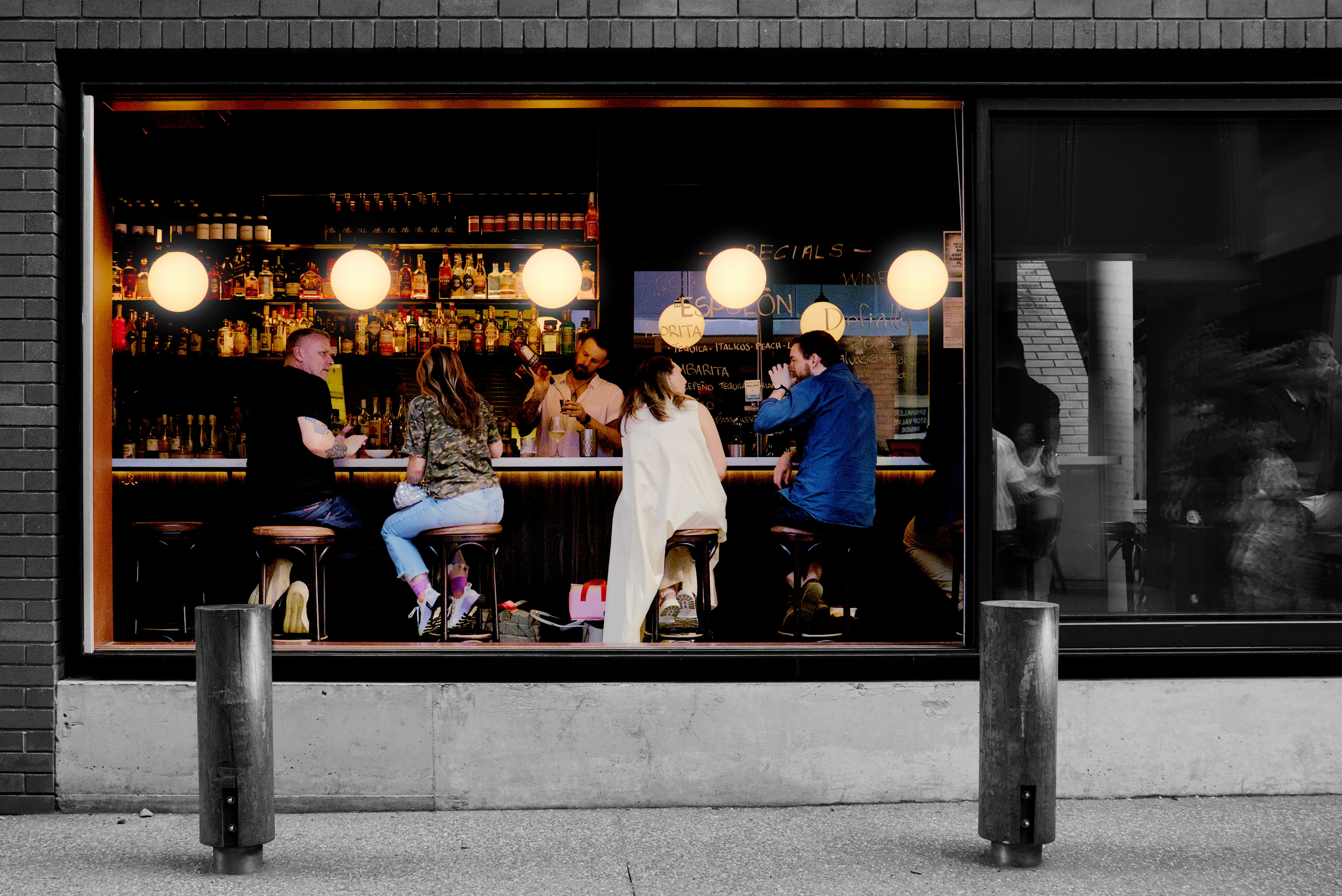 Midday Conversation at the Bar: A Window into Quiet City Life