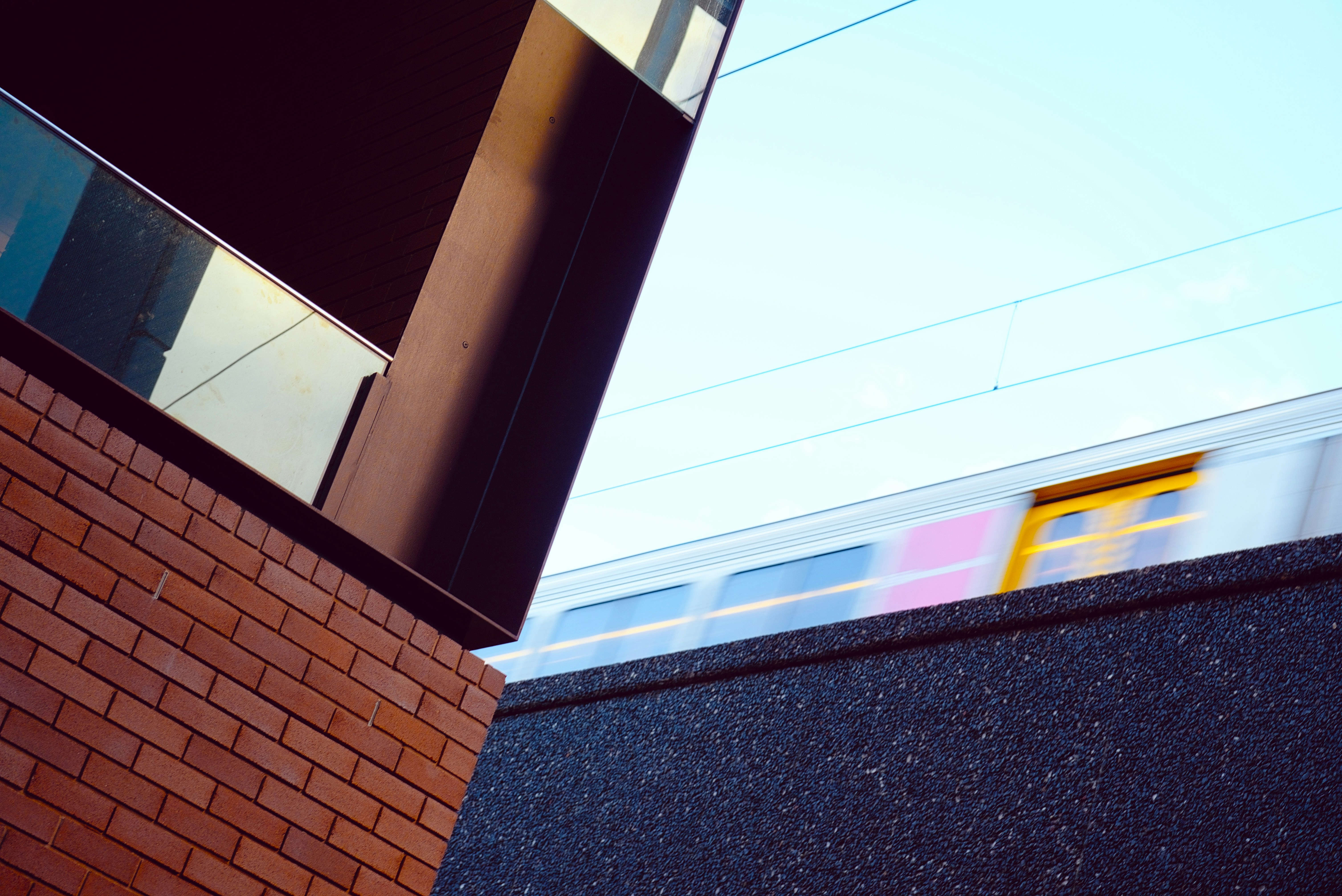 Motion at the Edge: Train and Architecture Collide in an Urban Tilt