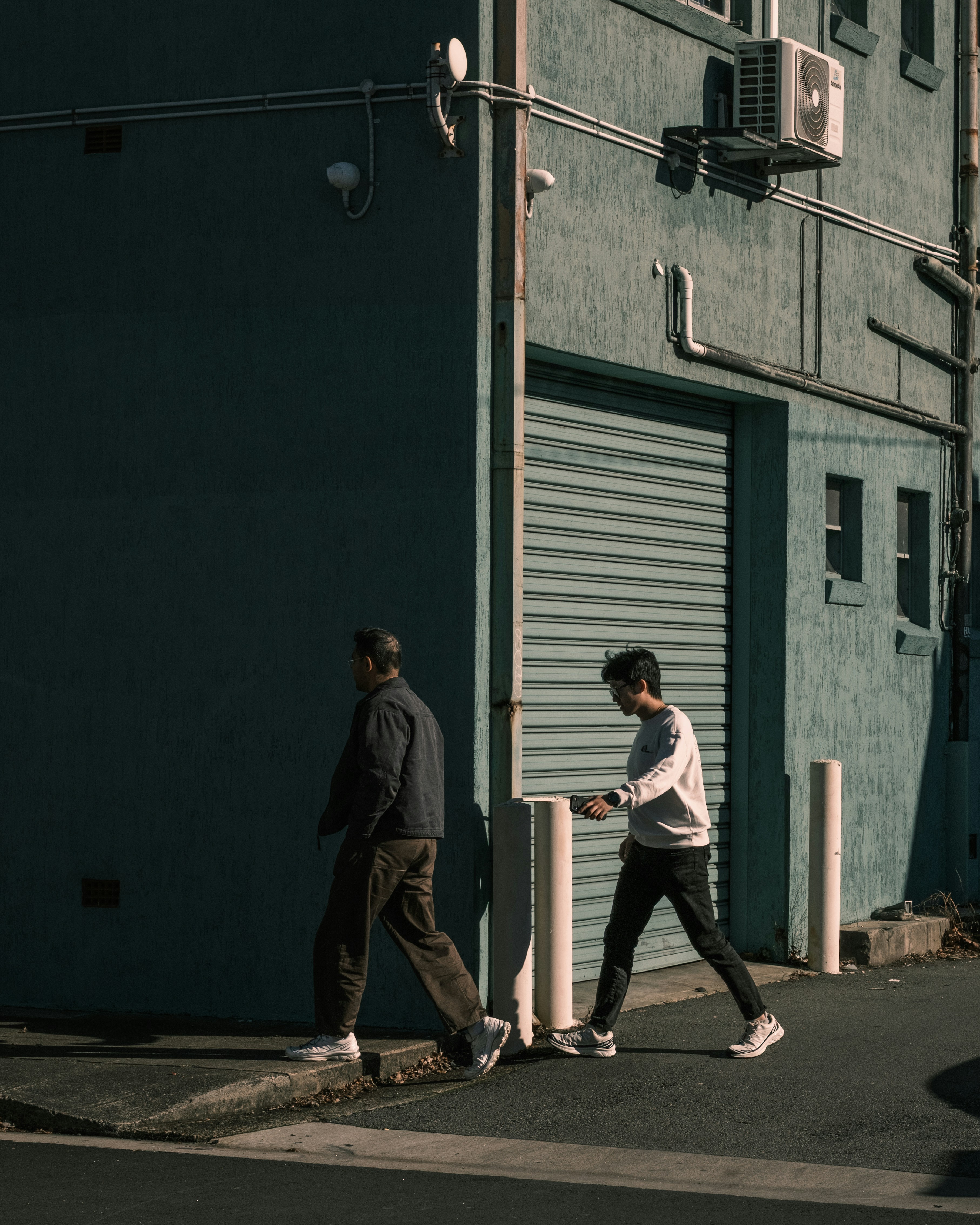Footsteps in a Sunlit Alley