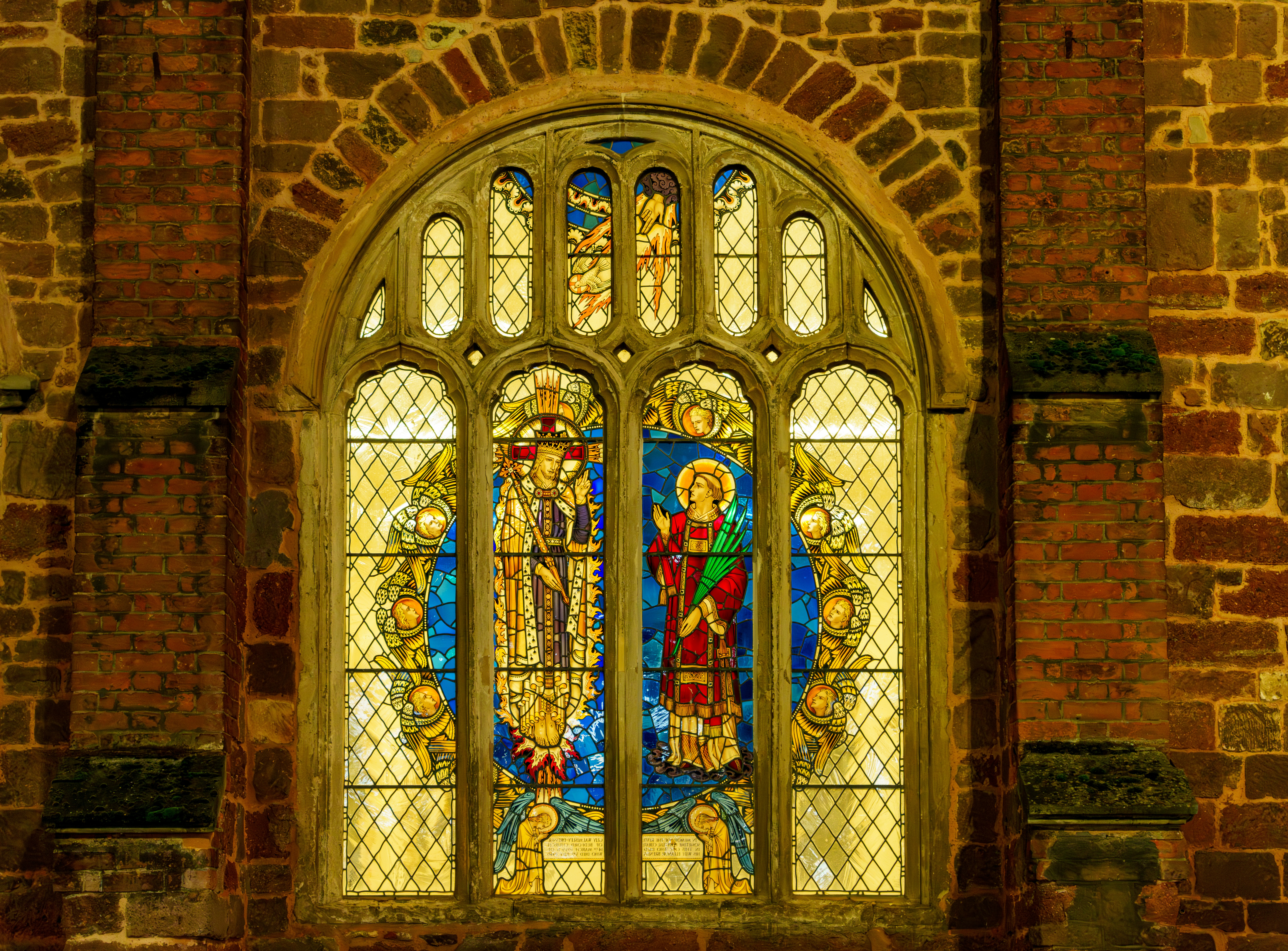Stained Glass Window Framed by Brick Archway
