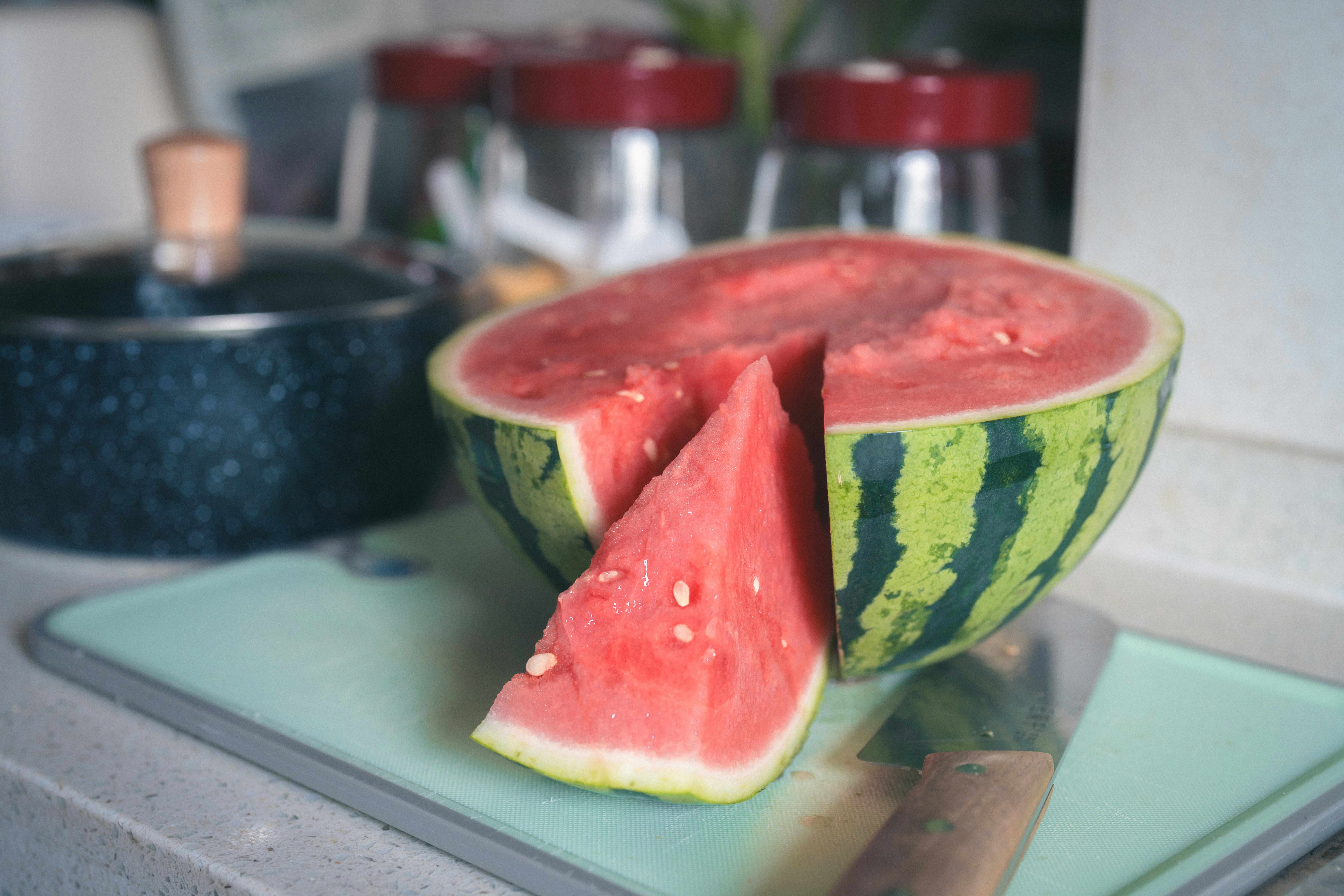 Watermelon Wedge on a Glass Board: Midnight Snack in the Kitchen
