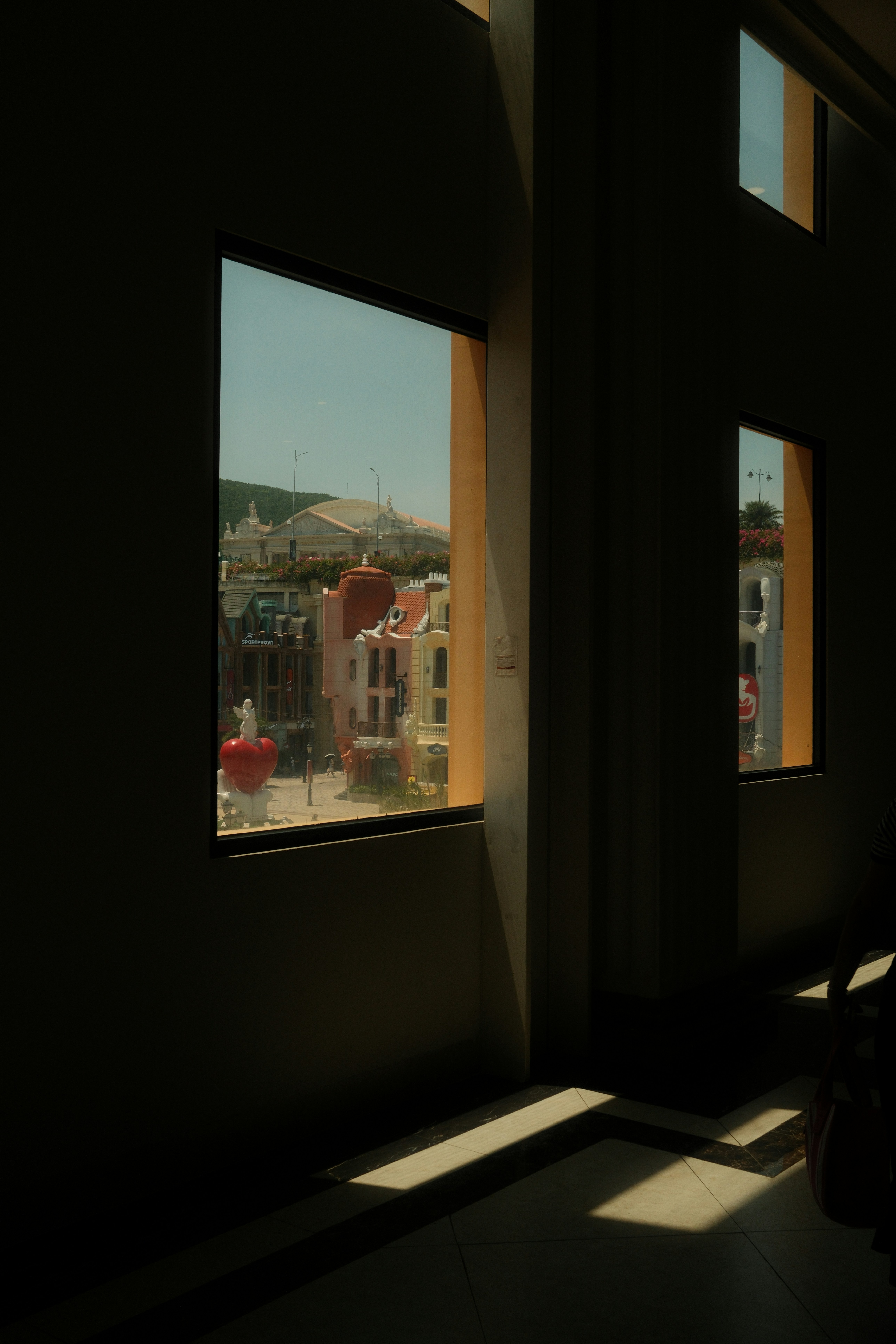 Morning Light Through Museum Windows onto Playful Street Scene