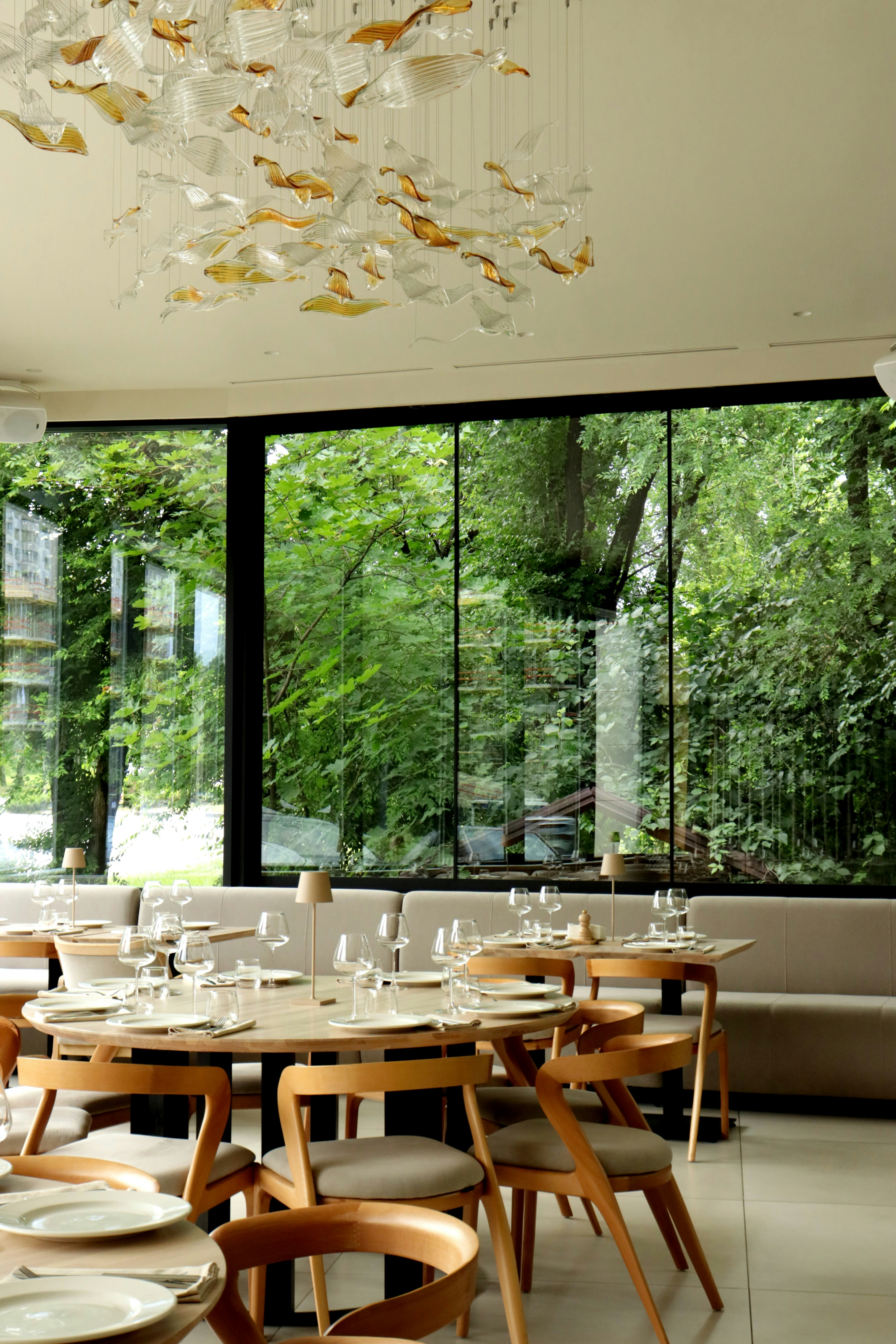 Sunlit Dining Room Framed by Verdant Window View