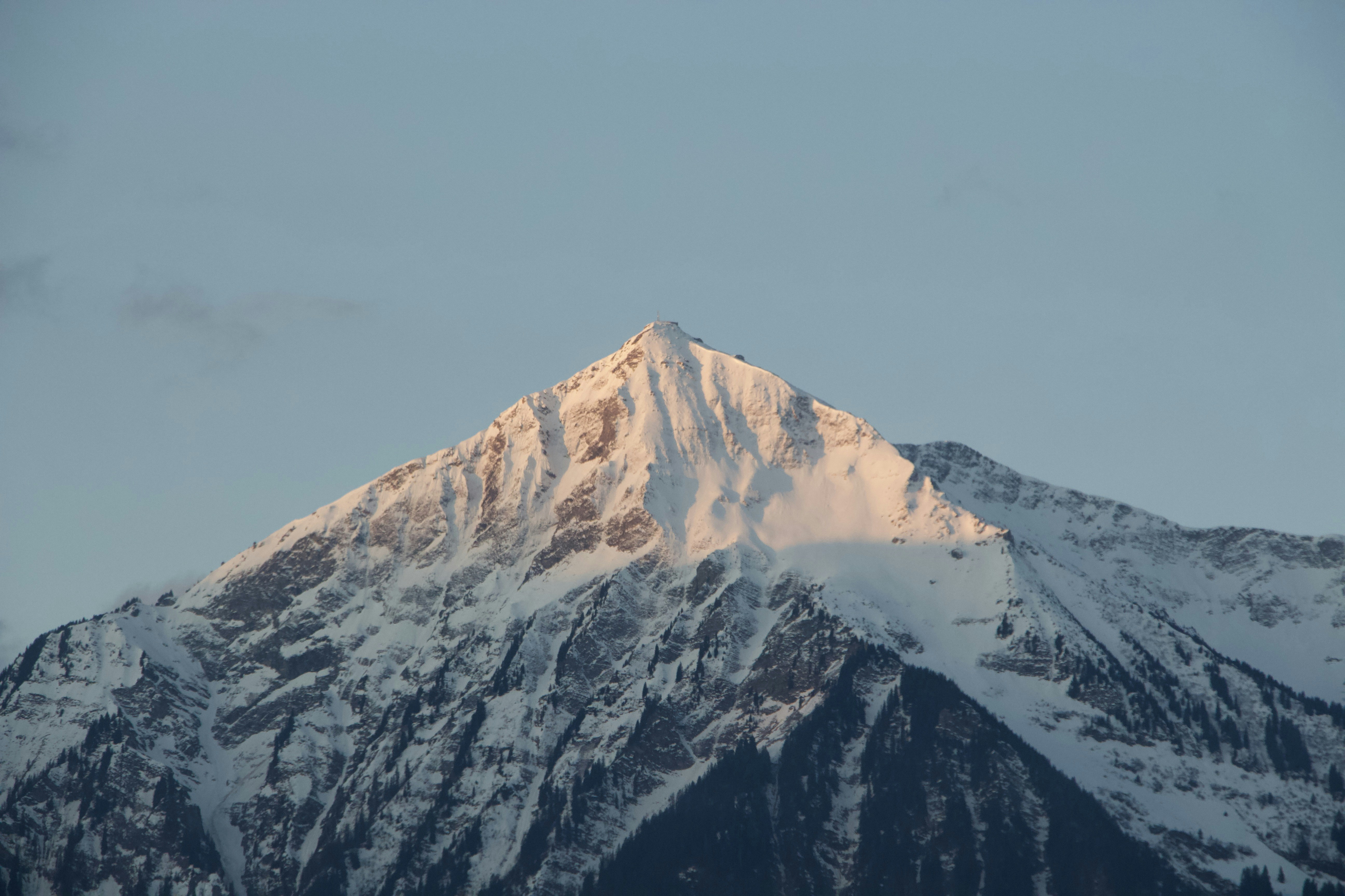 Snow-Glint Summit: A Peak Painted in Twilight Light