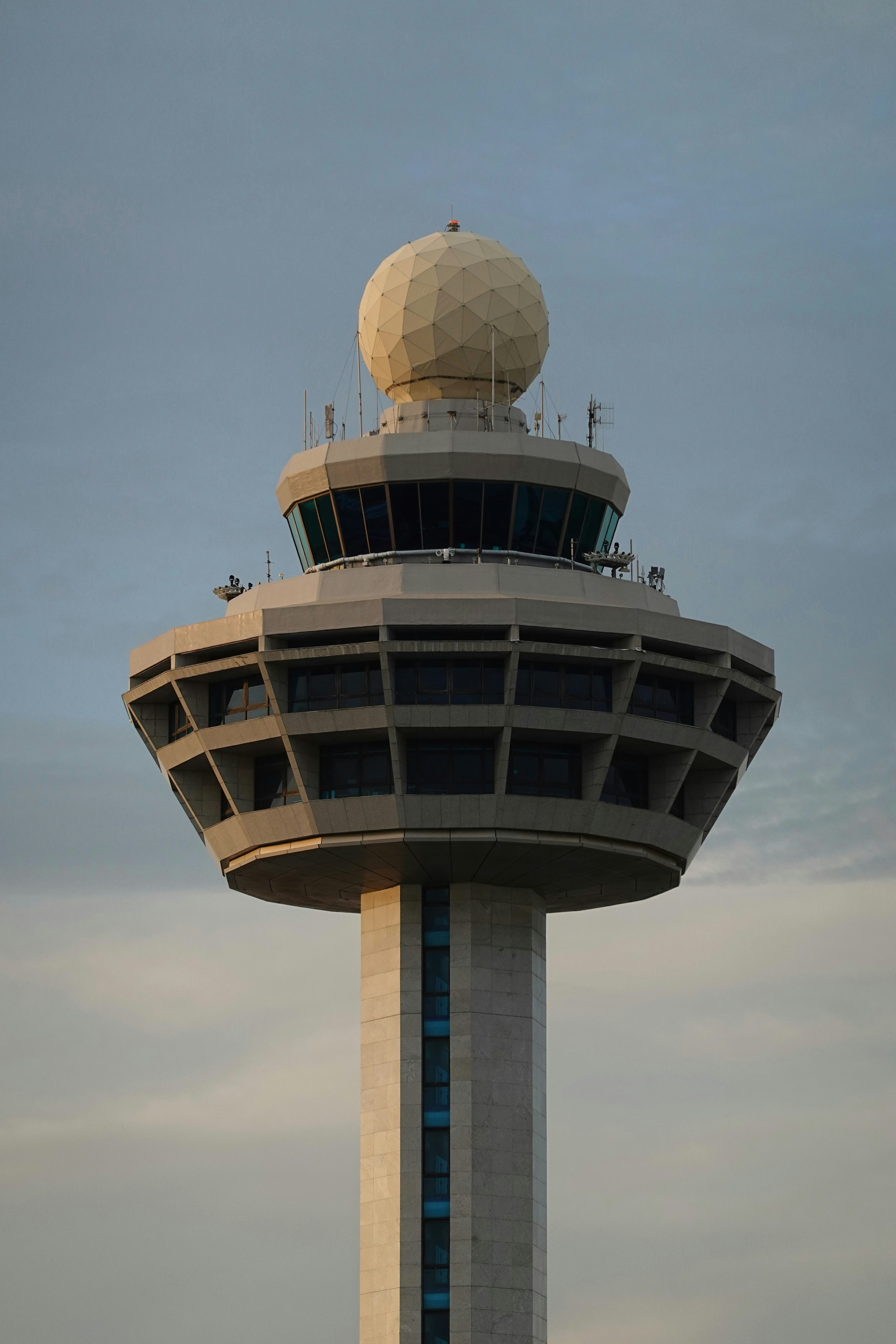 Control Tower Crown: A Geometric Helios on Concrete Pillar