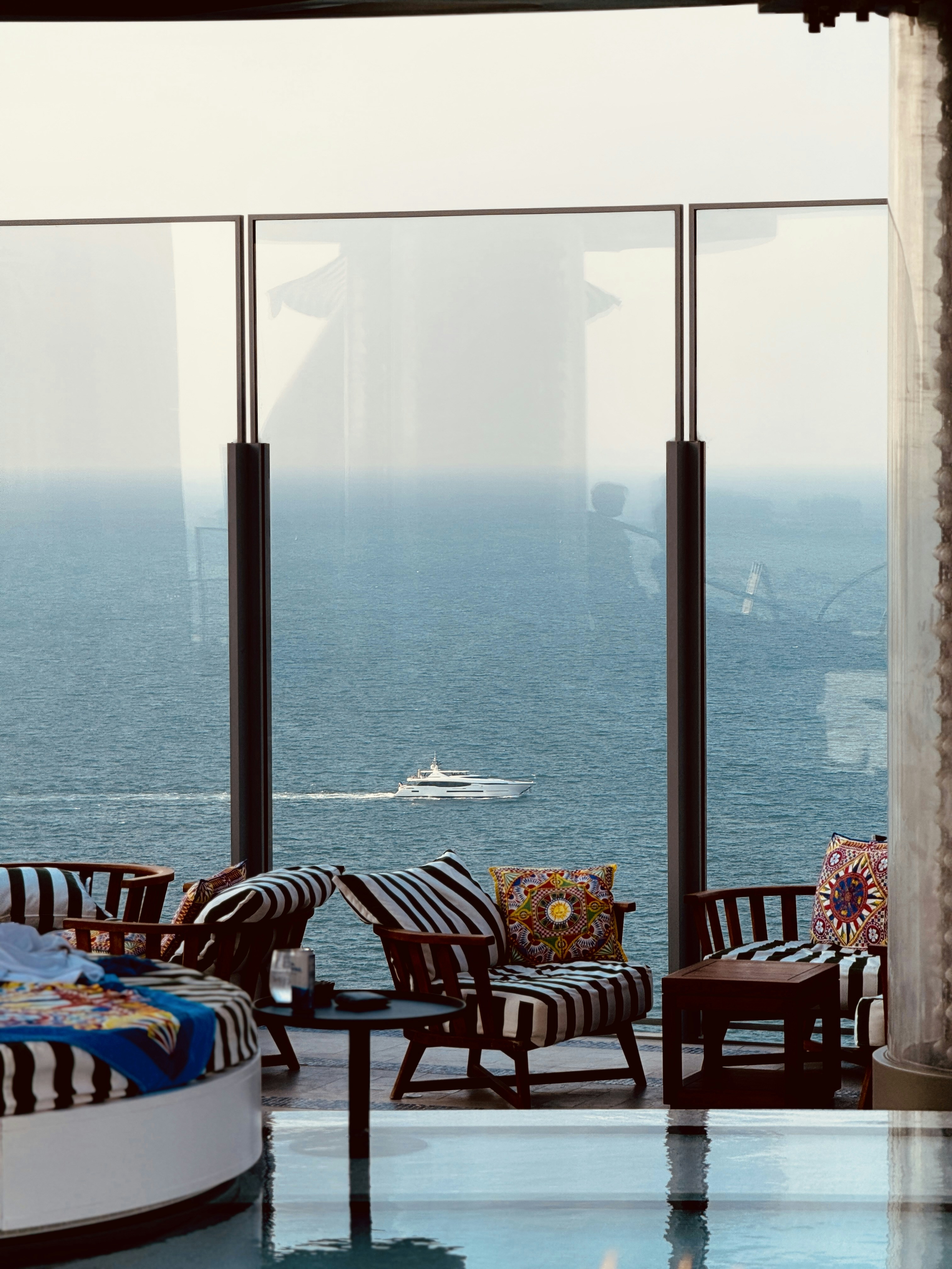 Coastal Lounge: Ocean View Through Glass Panels