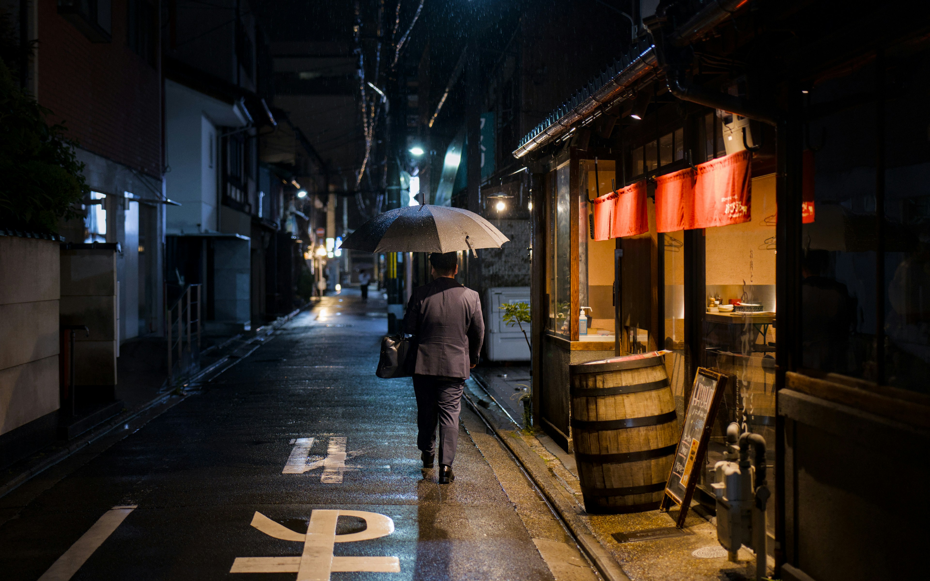 Night Walk with Umbrella: Quiet Street Beneath Neon Lanterns