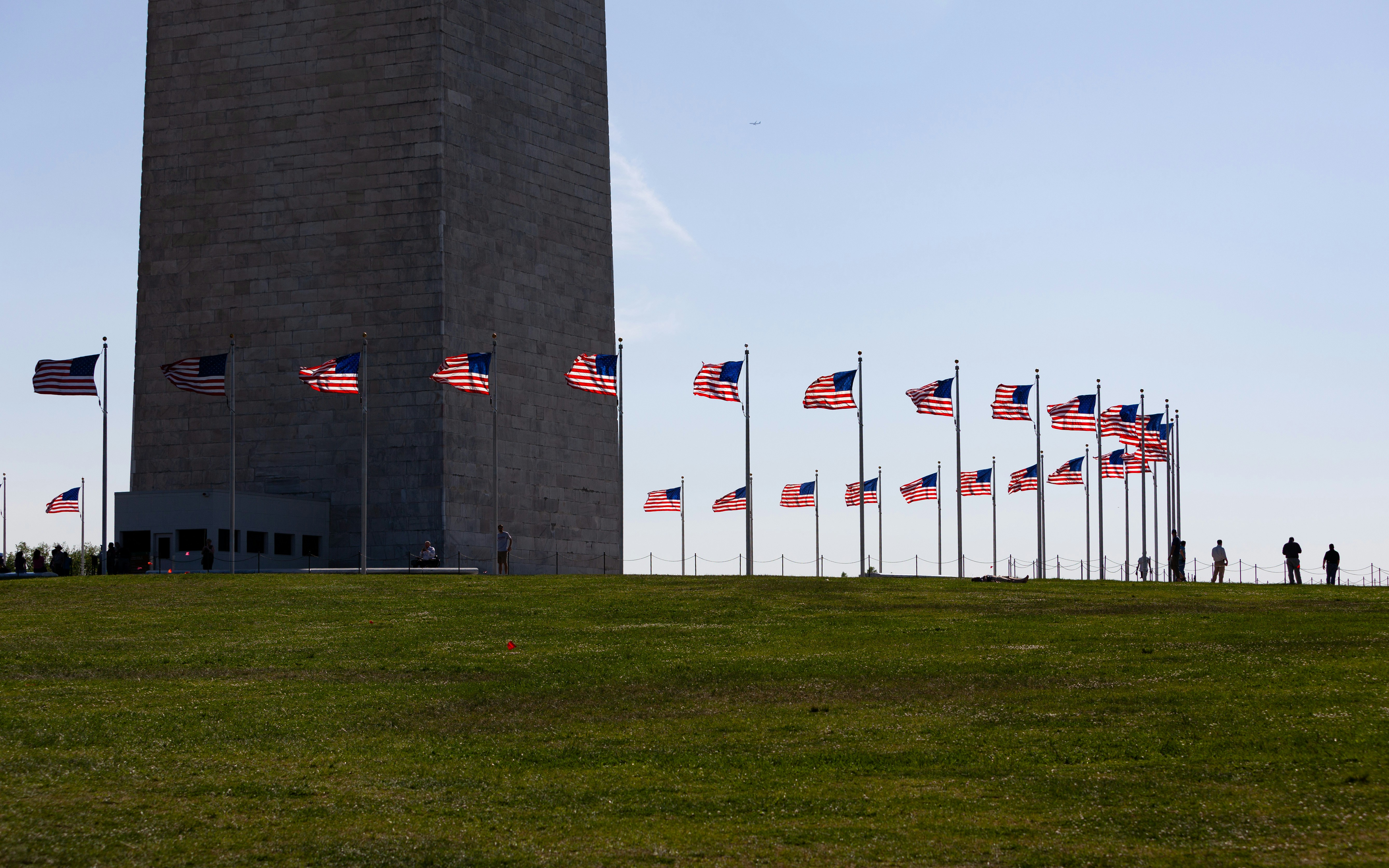Flags in the Shadow of a Monument