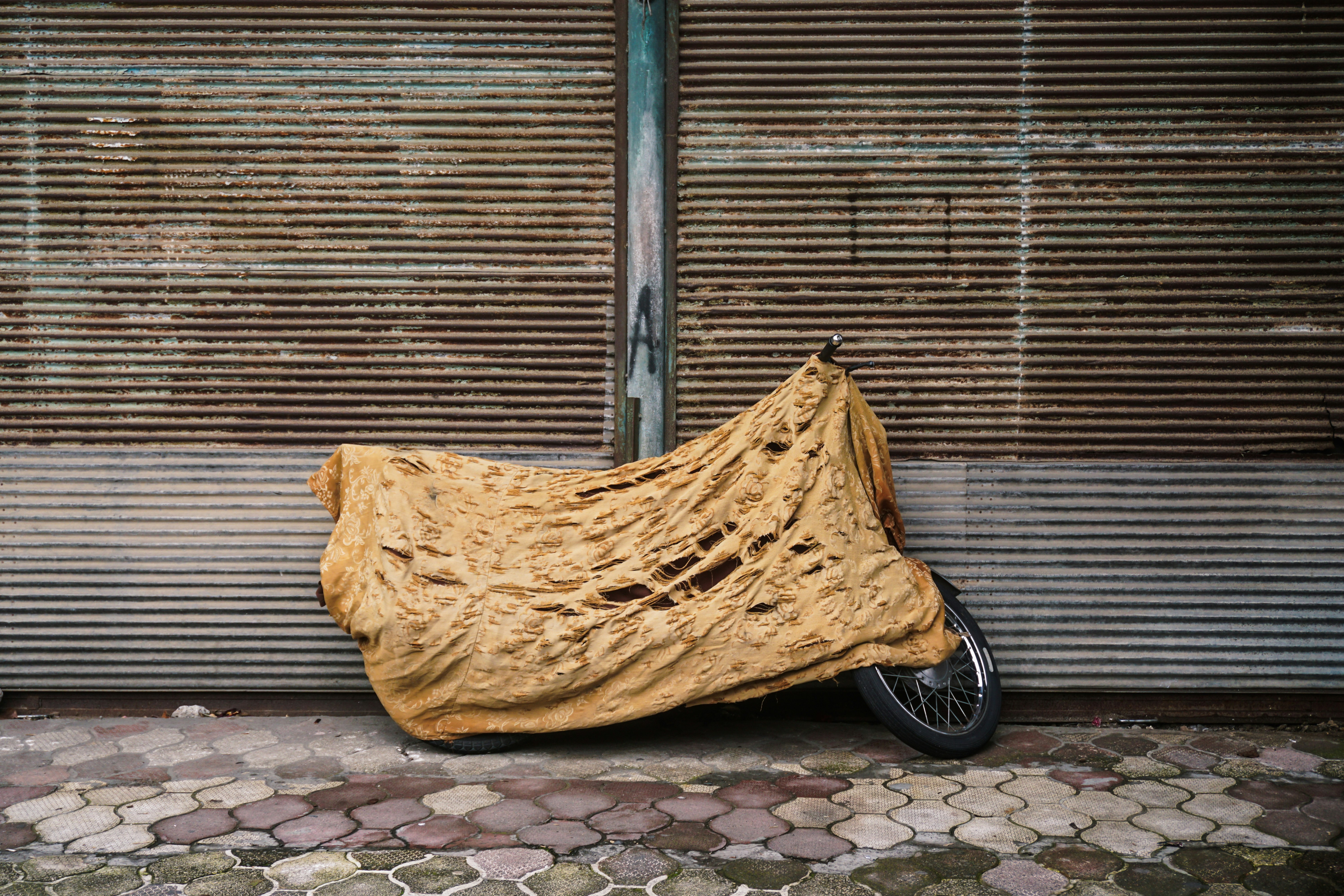 Shredded fabric clinging to a forgotten ride.