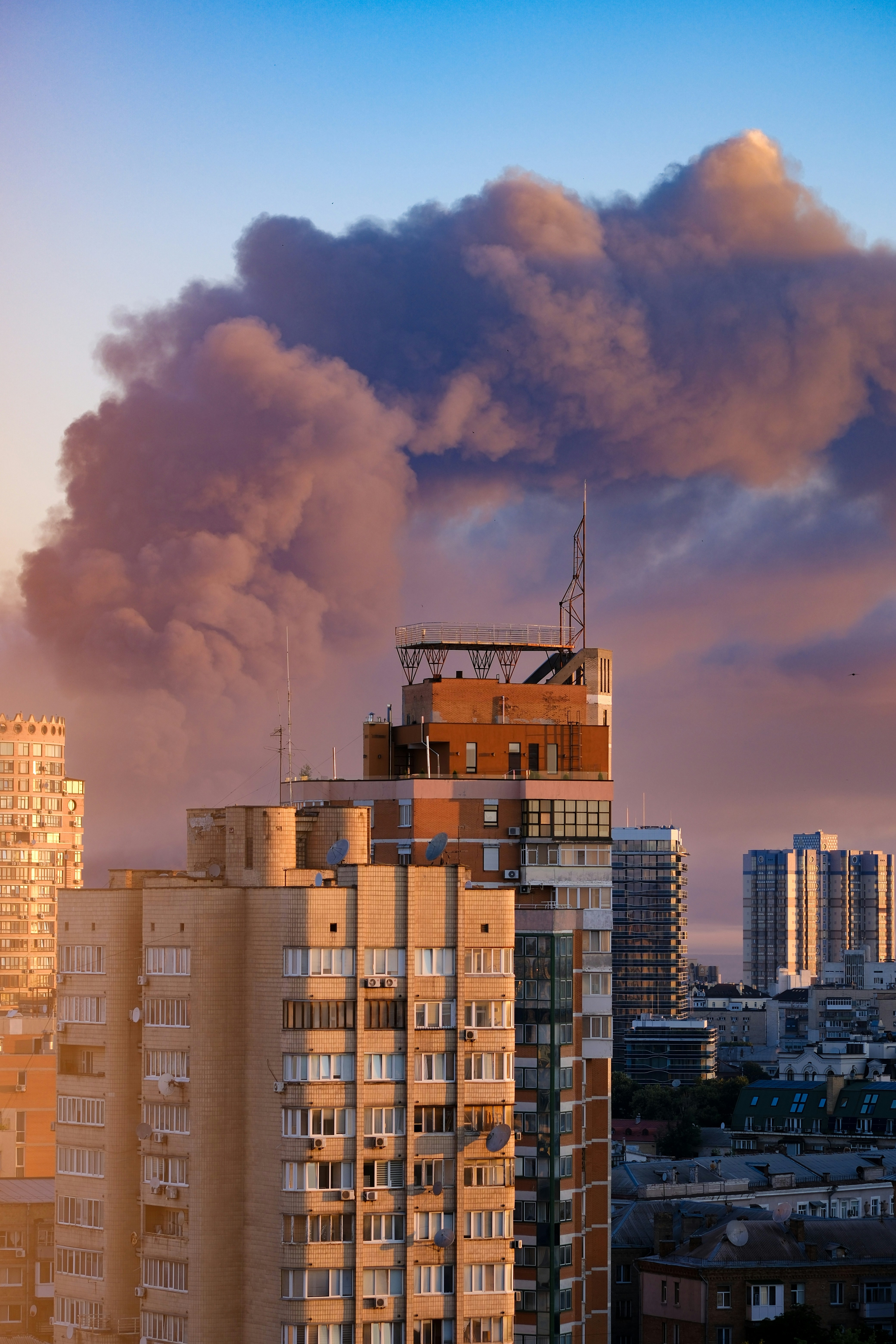 Sunset Reverie Over the City: Rooftops and Cloudscape