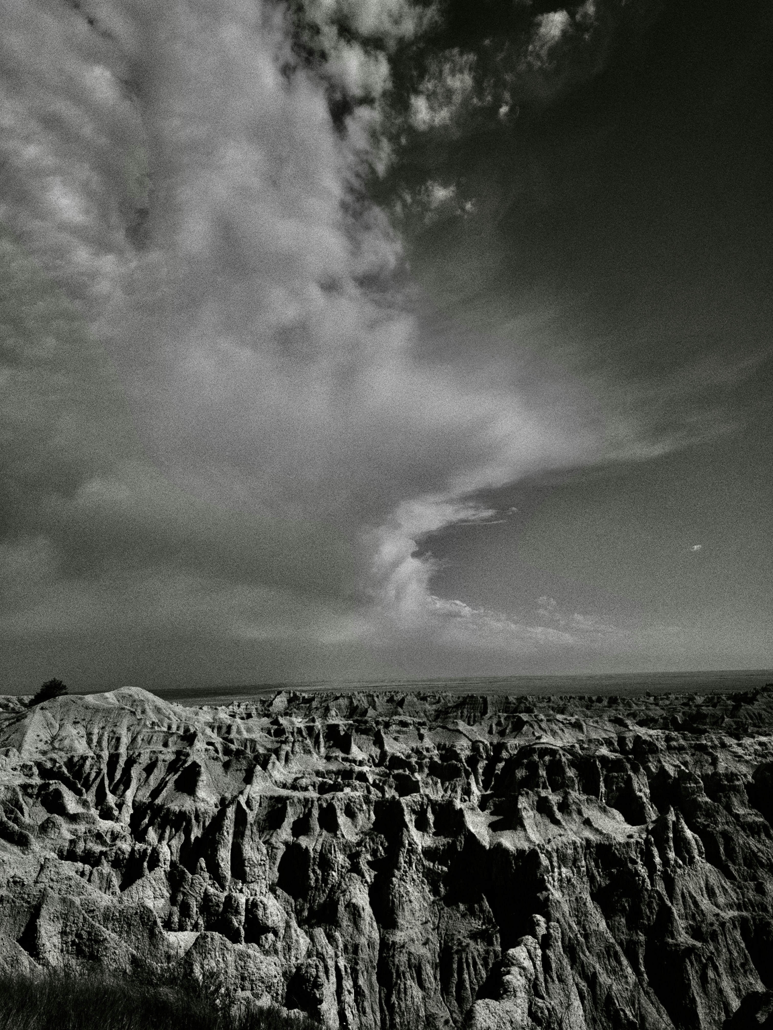 Chiseled Canyon Under a Billowing Sky