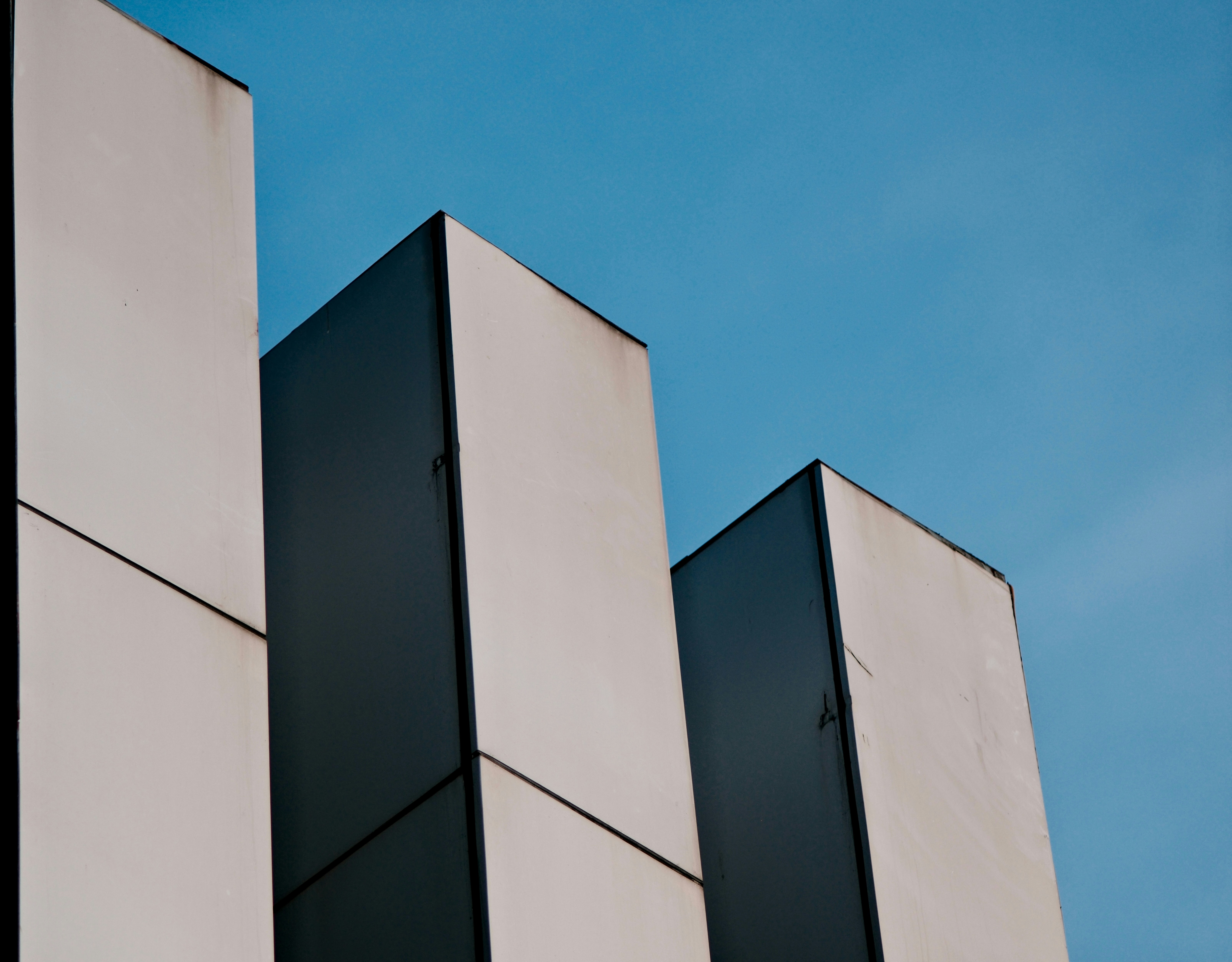 Vertical Pillars Against a Clear Sky