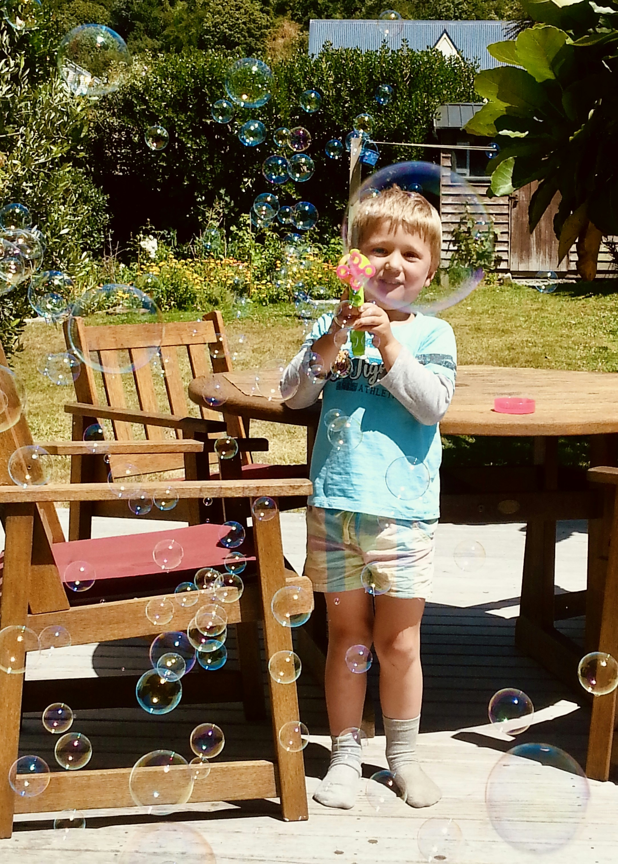 Bubble Symphony: A Backyard Portrait of Joy