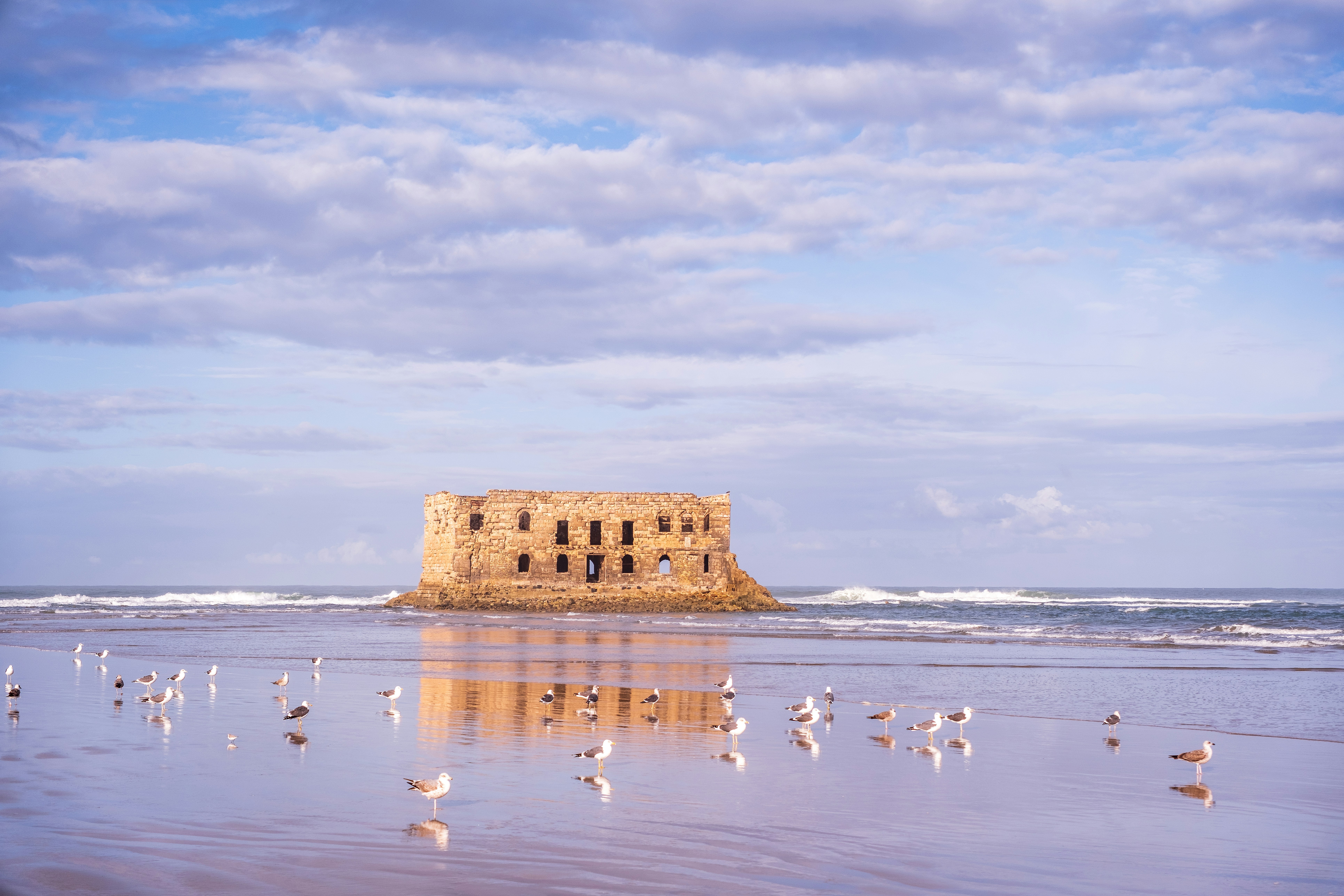 Isolated Fortress at Dusk: A Quiet Sea Fortress Reaches the Horizon
