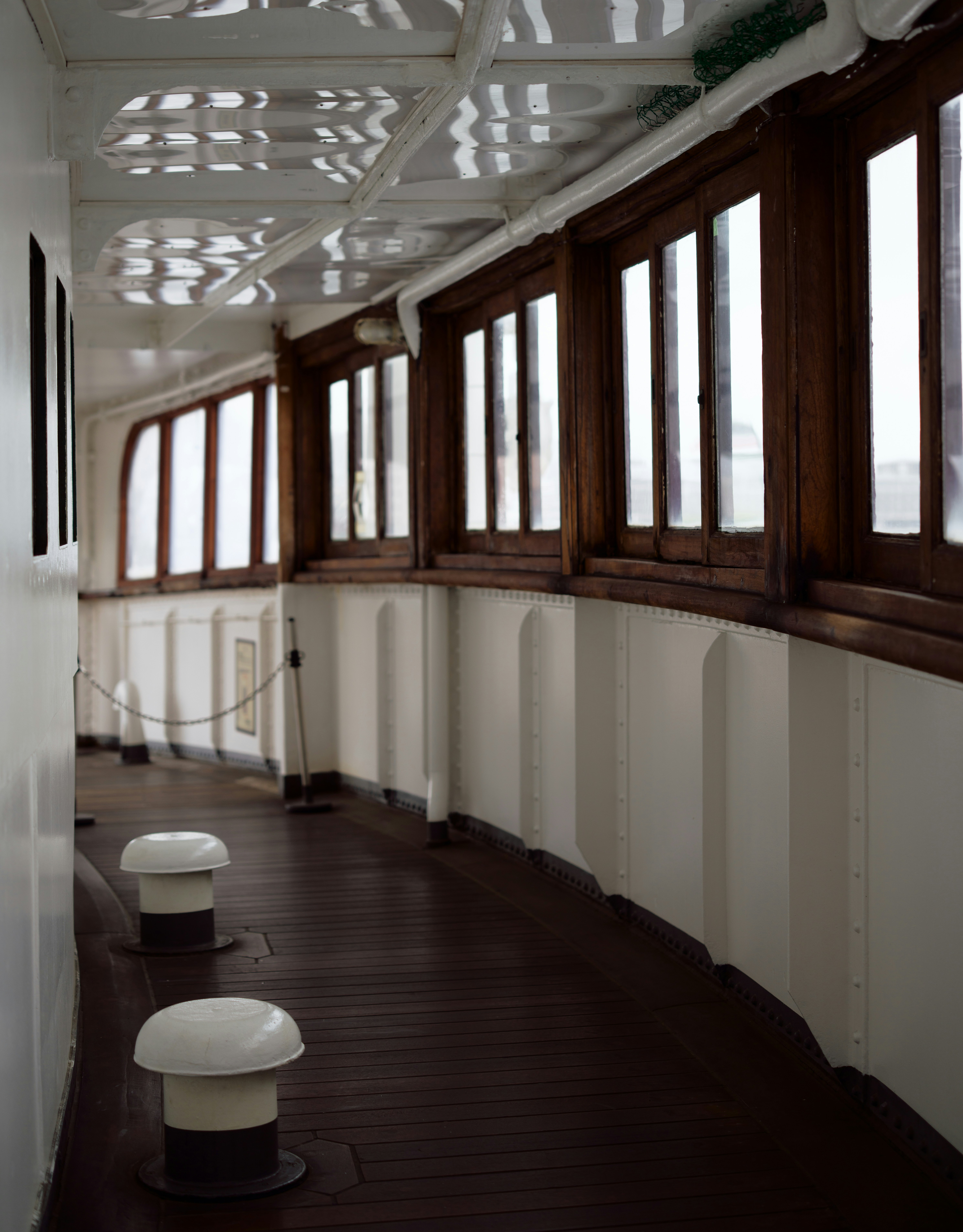 Sea-Trail Corridor: Wooden Windowed Walkway on the Ship Deck