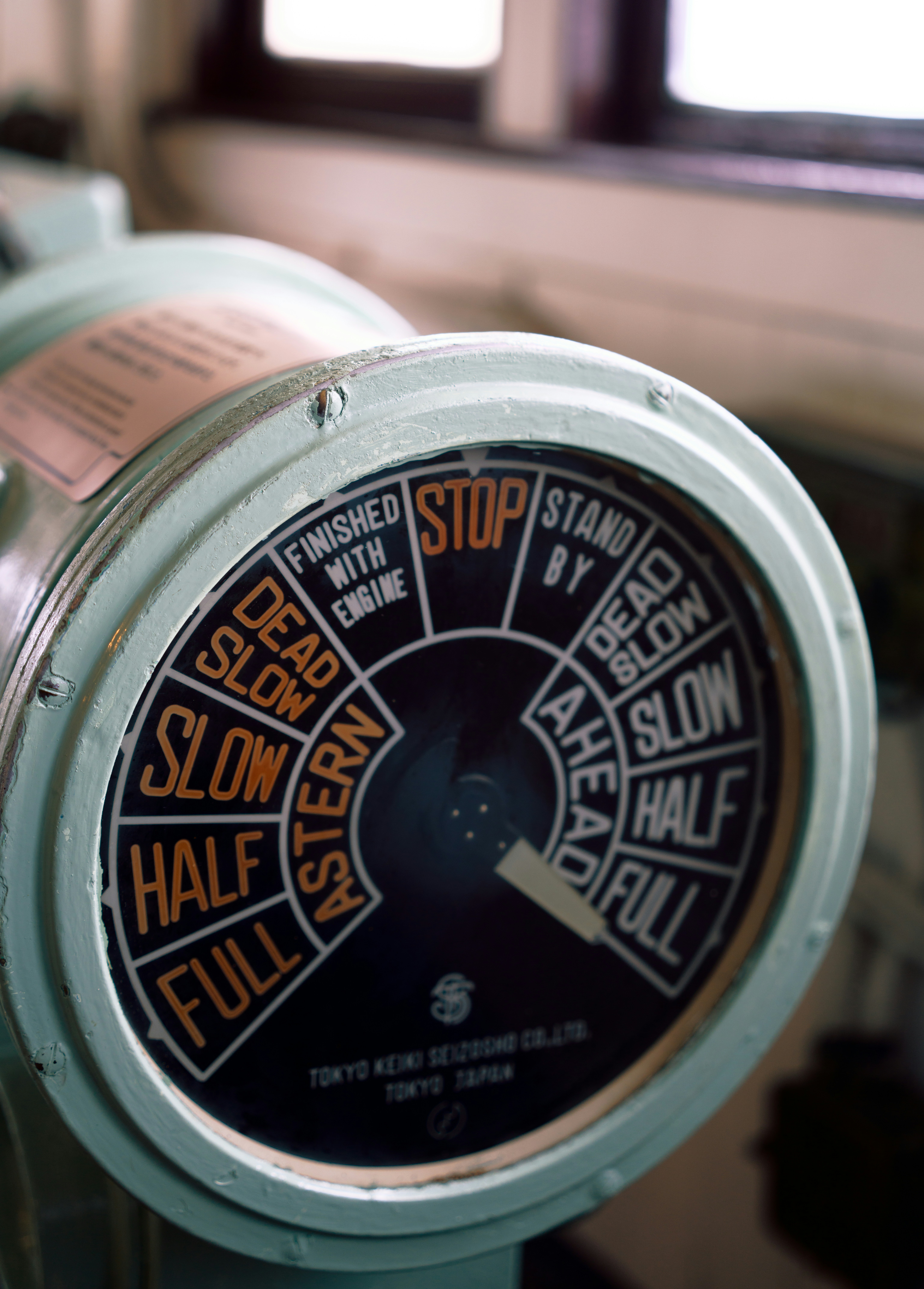 Clockwork Signal: A close-up of a vintage green dial in soft focus