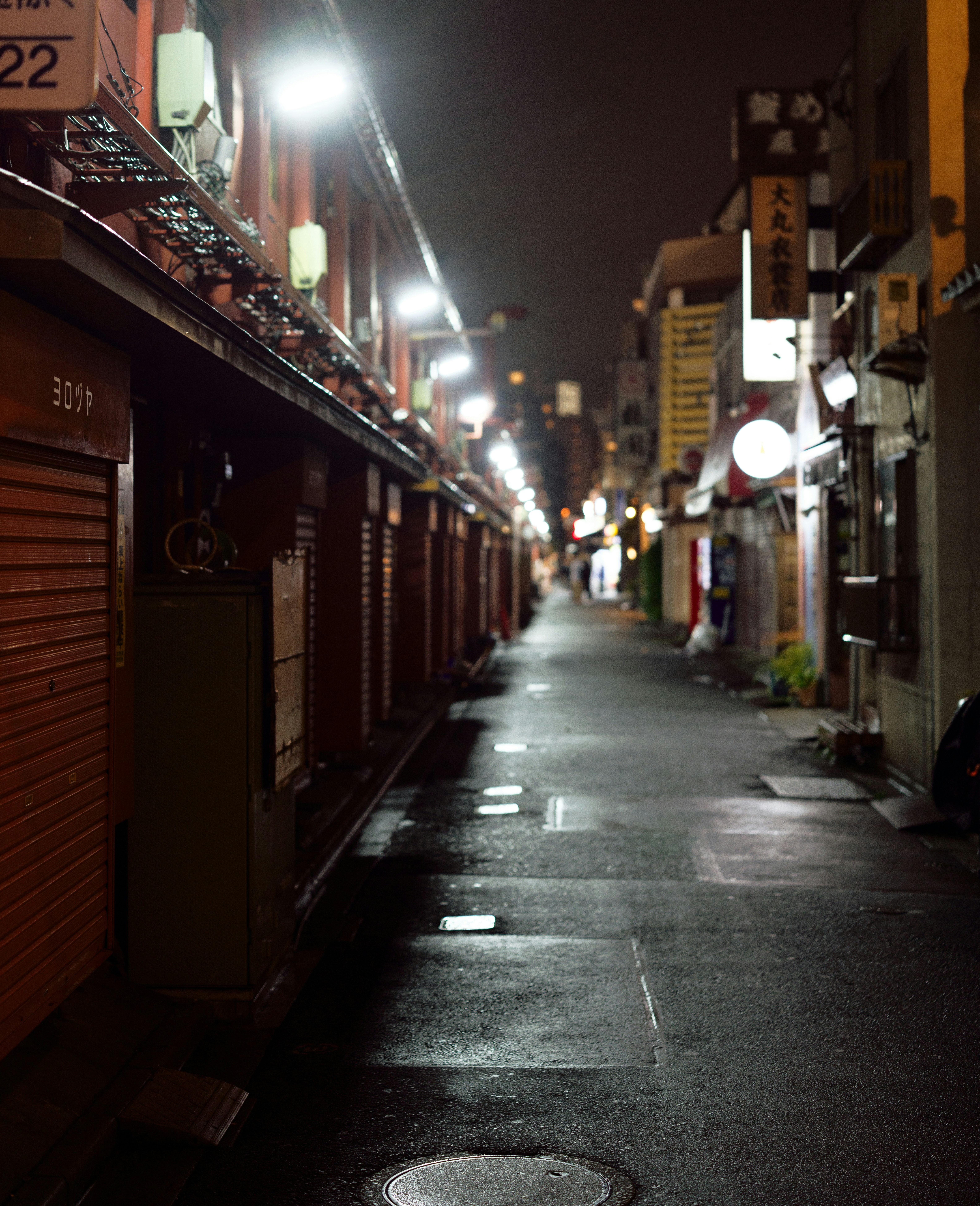 Neon Alley After Dark: A Quiet Street Speckled with Light