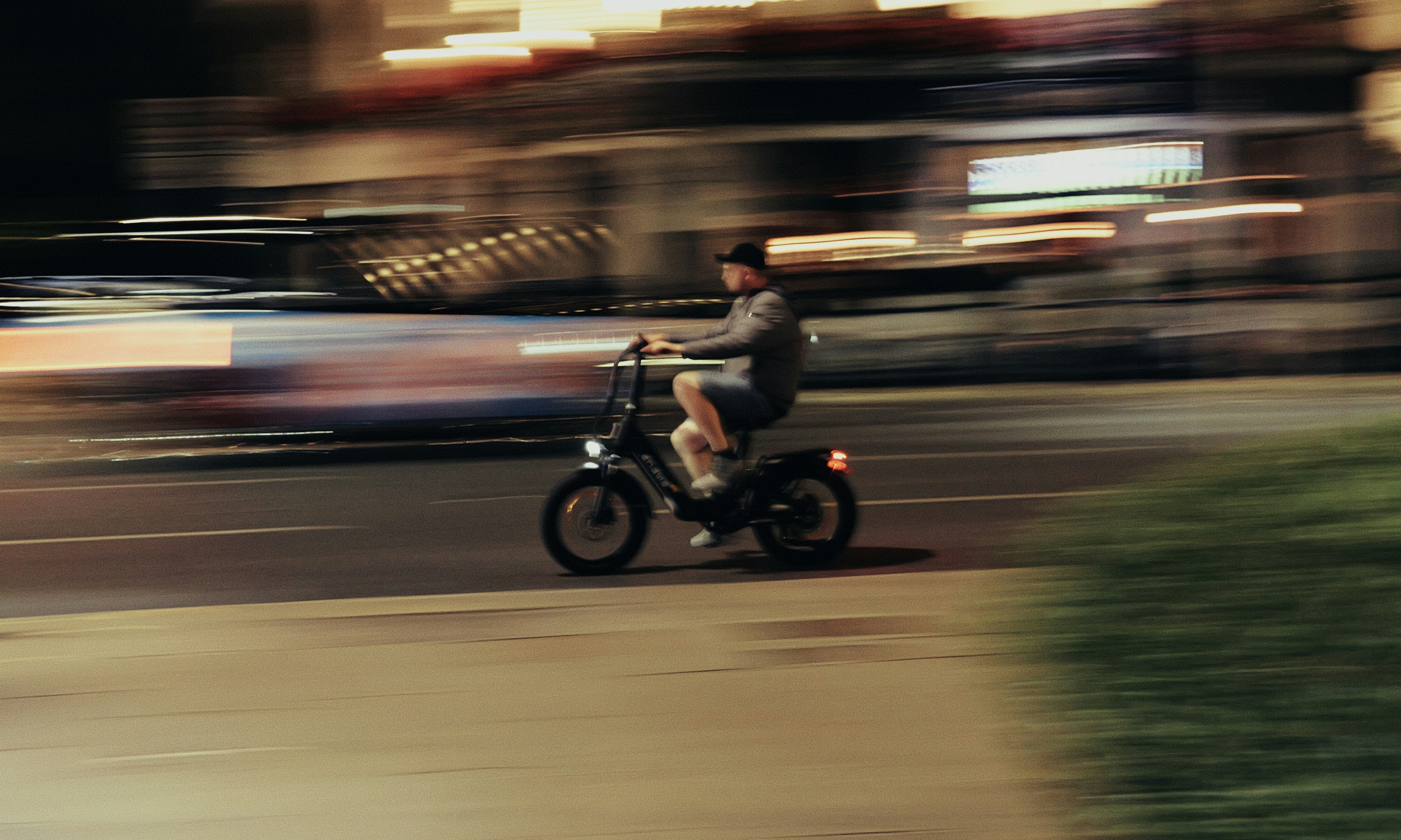 Night Rider on a Blurred Boulevard