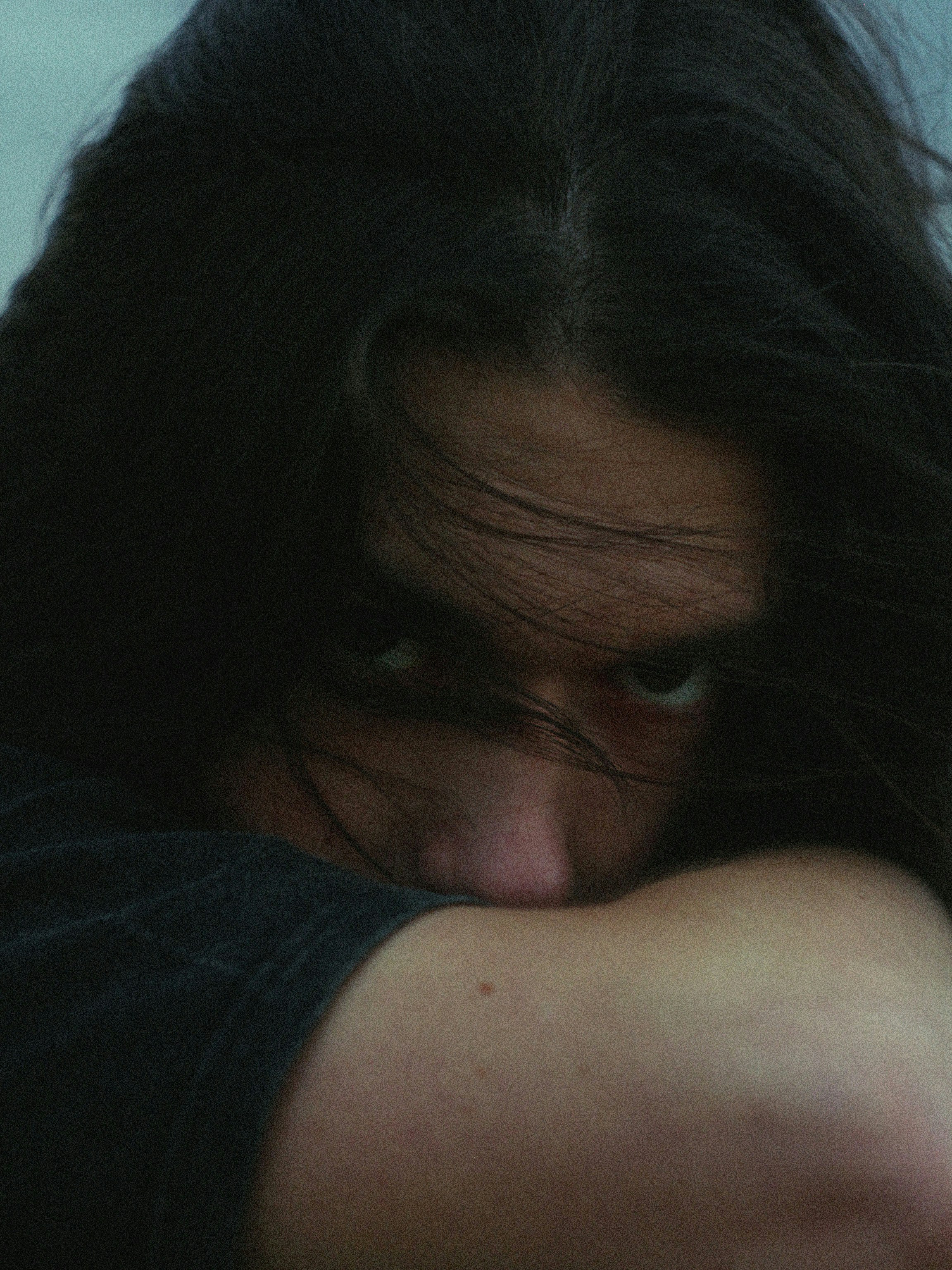Veiled Gaze: A Close Encounter with Shadowed Intensity