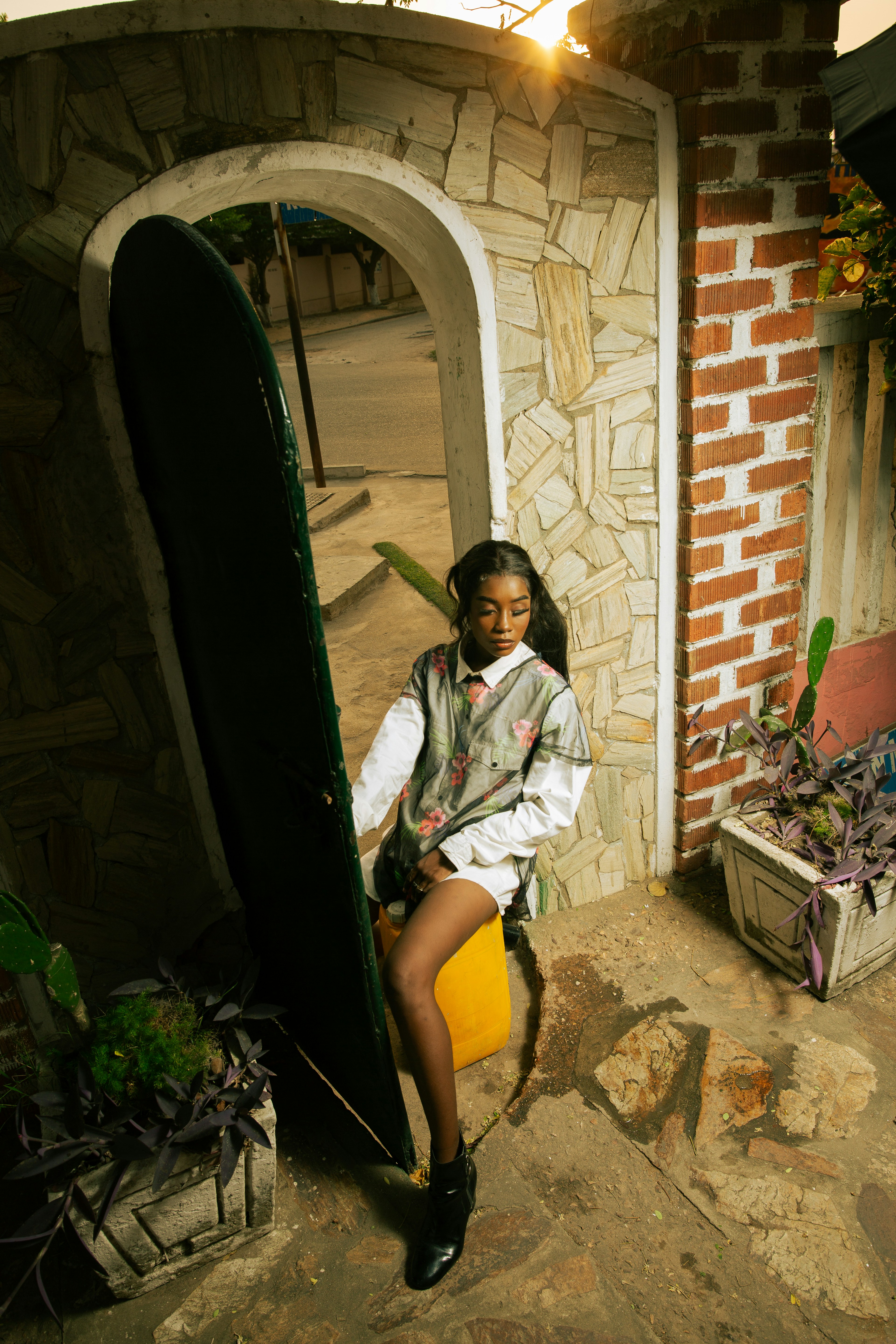 Portrait at the Arch: a Quiet Studio-Feeling Moment by the Doorway