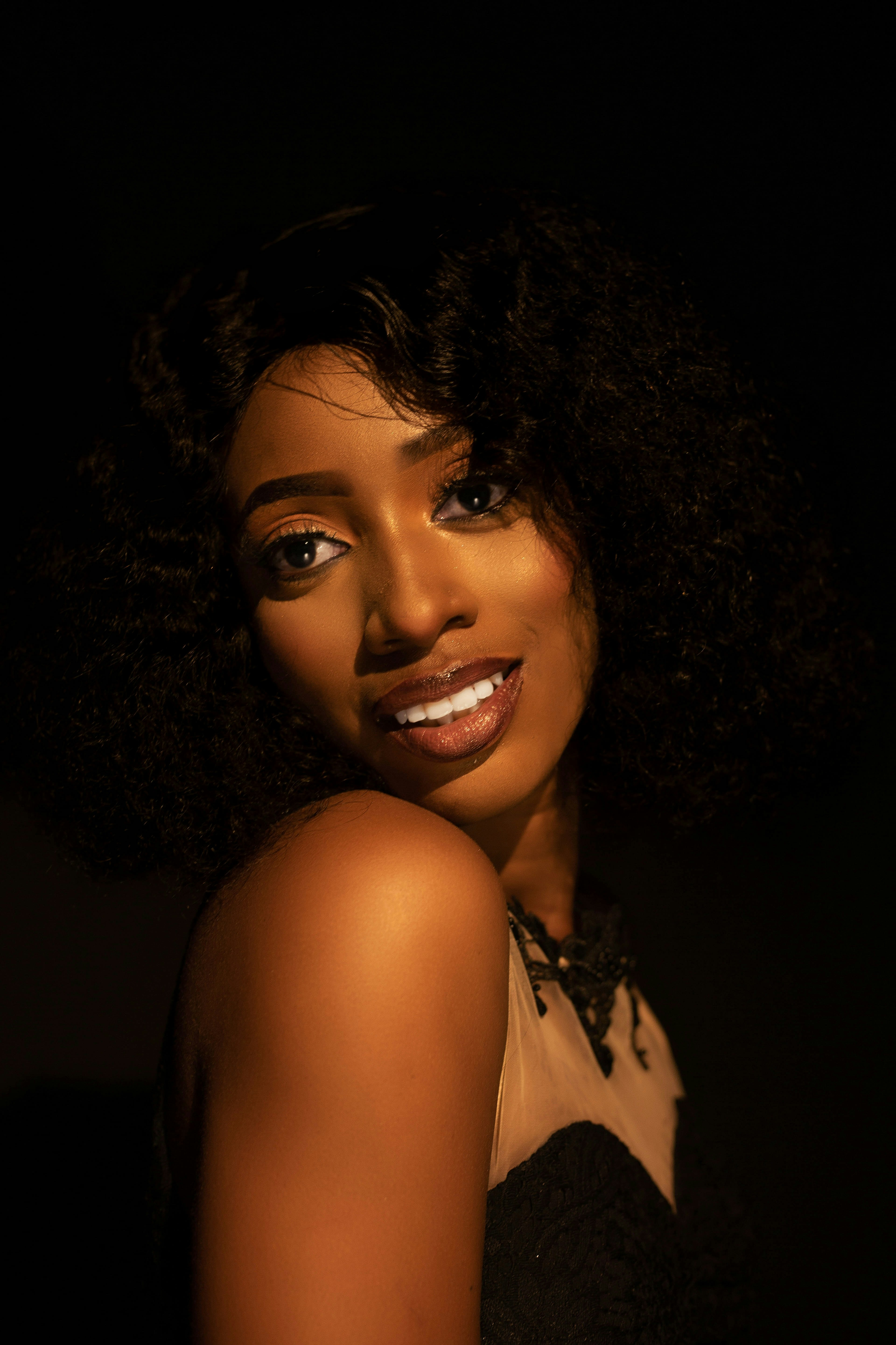 Golden Hour Glow: Portrait of Soft Light on a Silky Afro