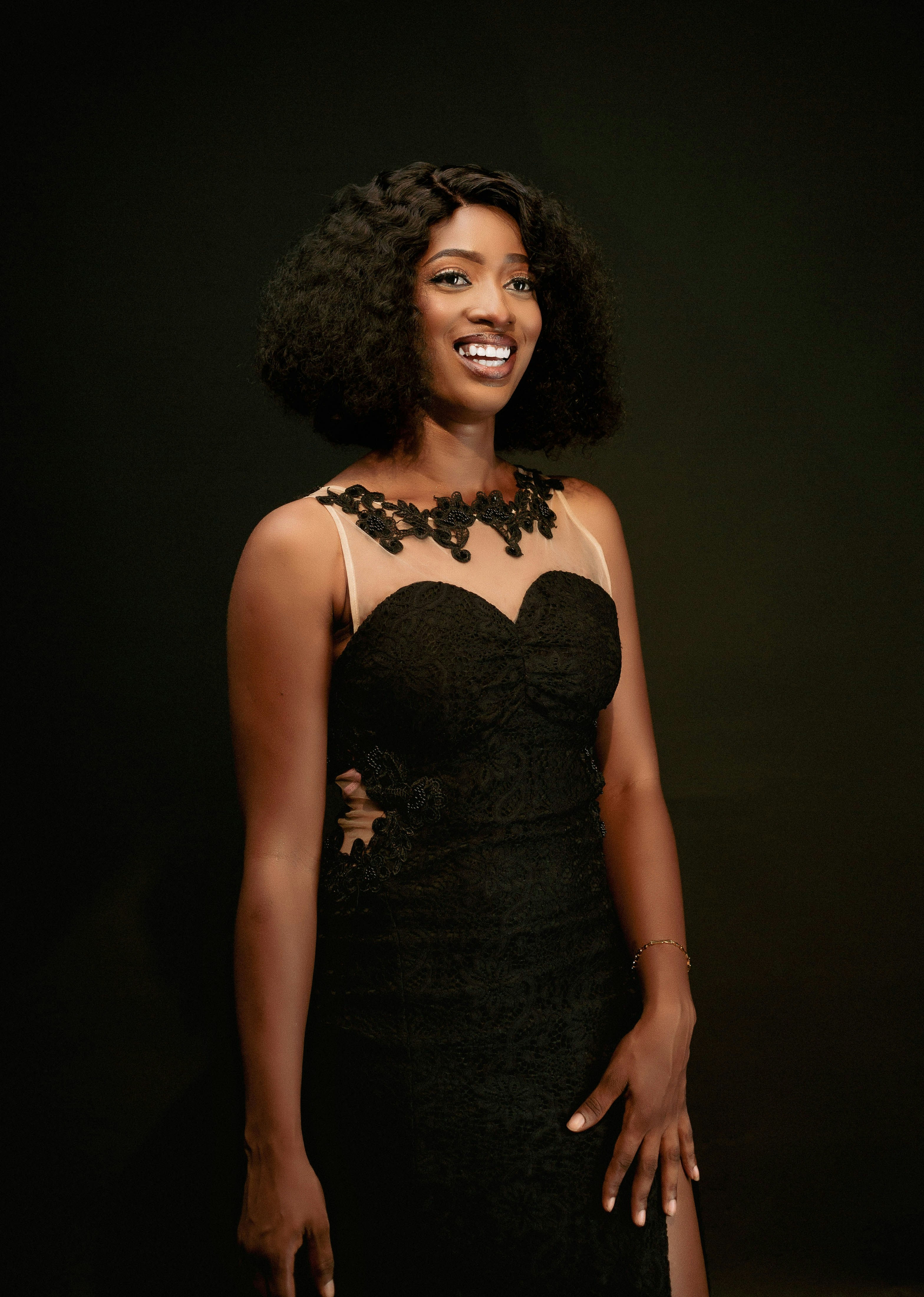 Midnight Lace: A Graceful silhouette under studio glow