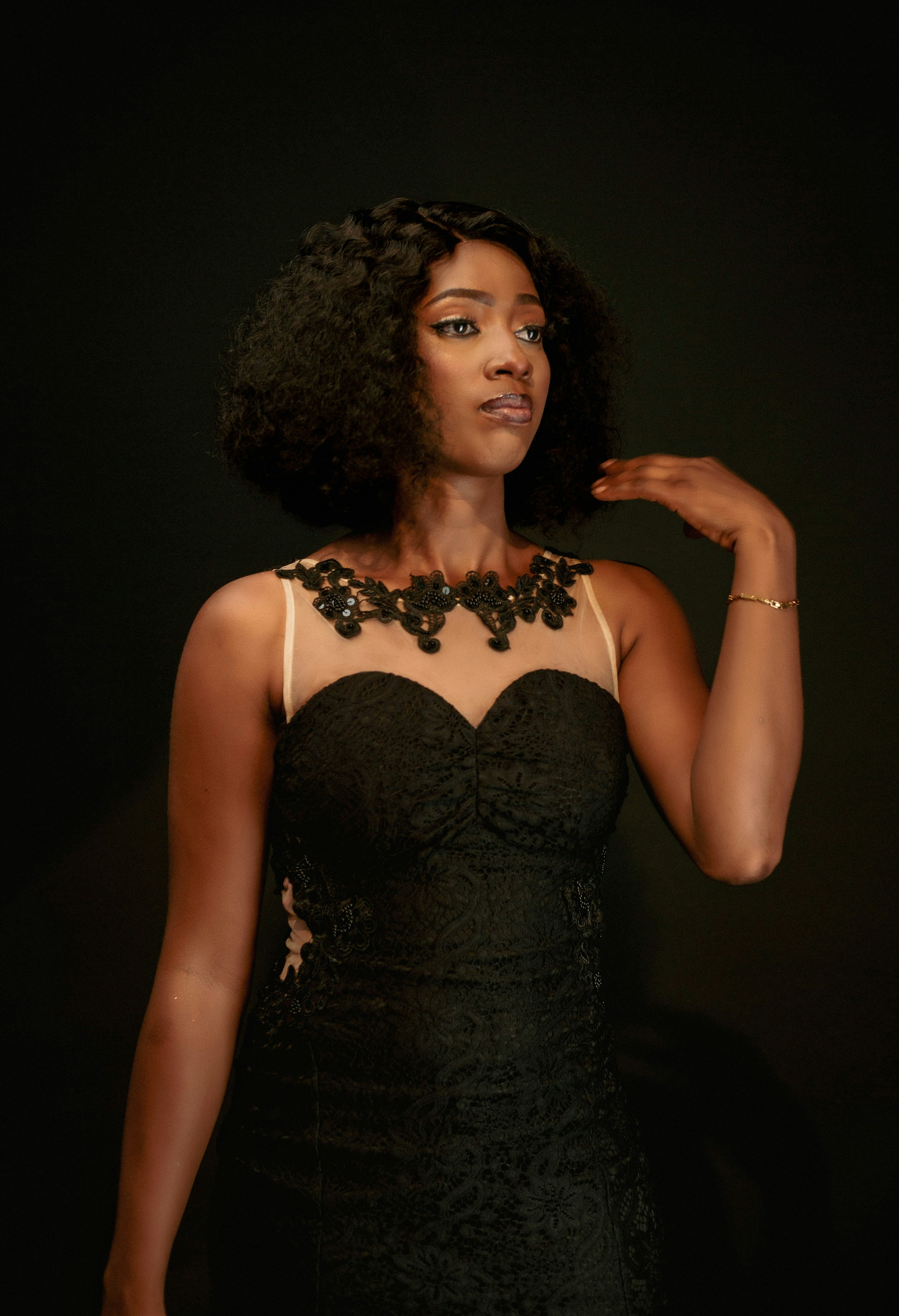 Elegant silhouette: a poised portrait in lace and shadow