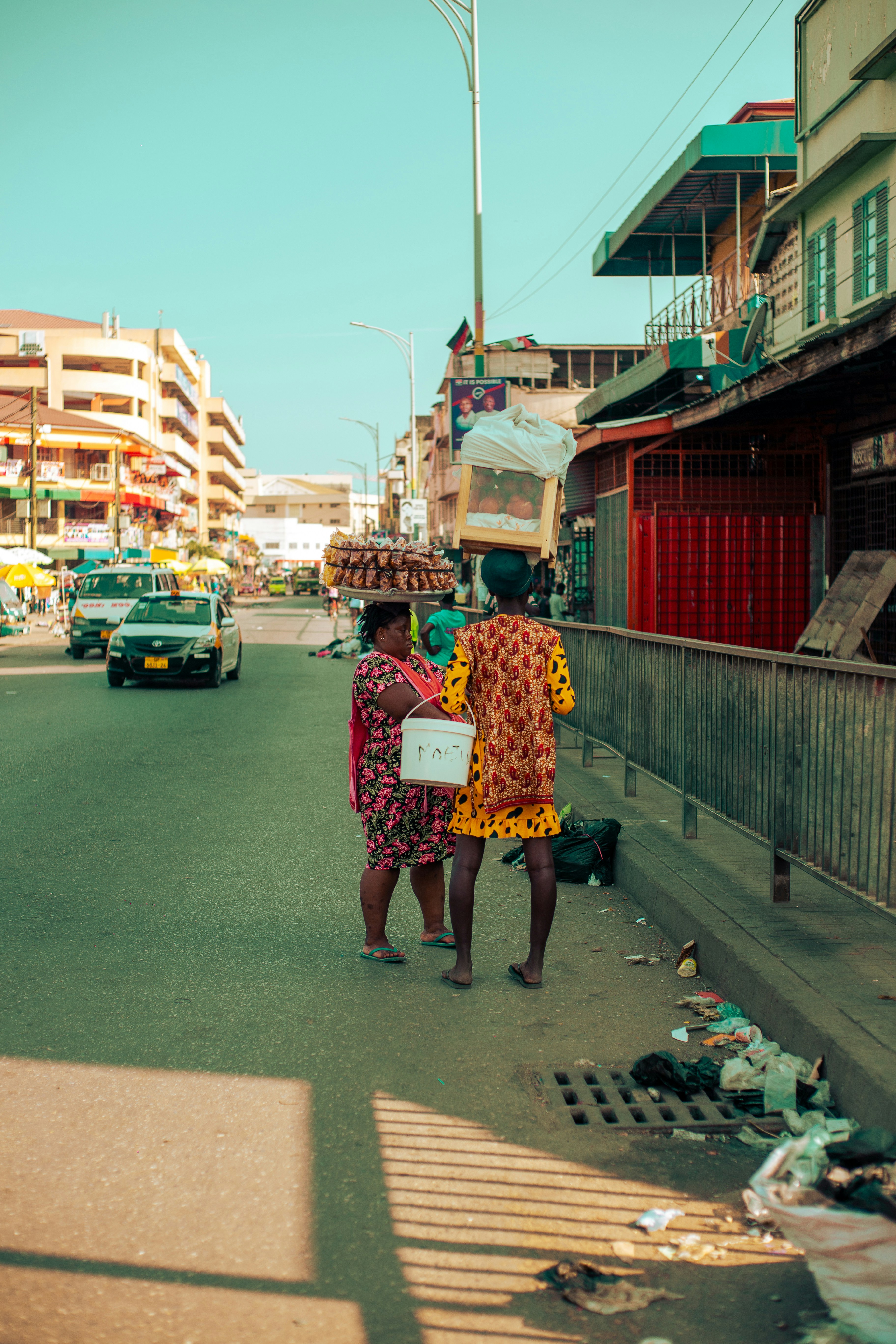 Street Vendors on a Sunlit African Boulevard