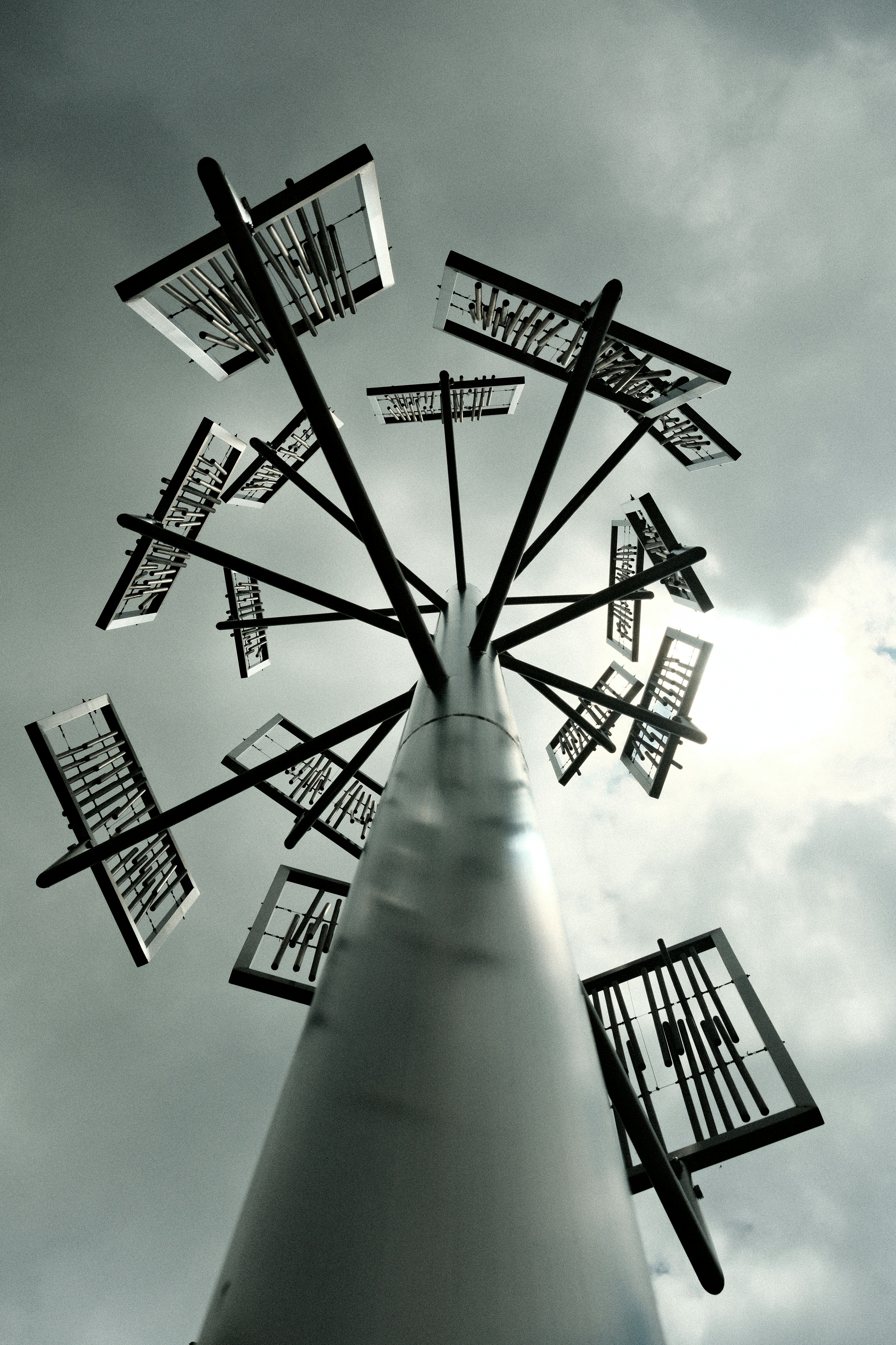 Gridded Skyward: A Centrifugal Pole Spreads Its Shadow