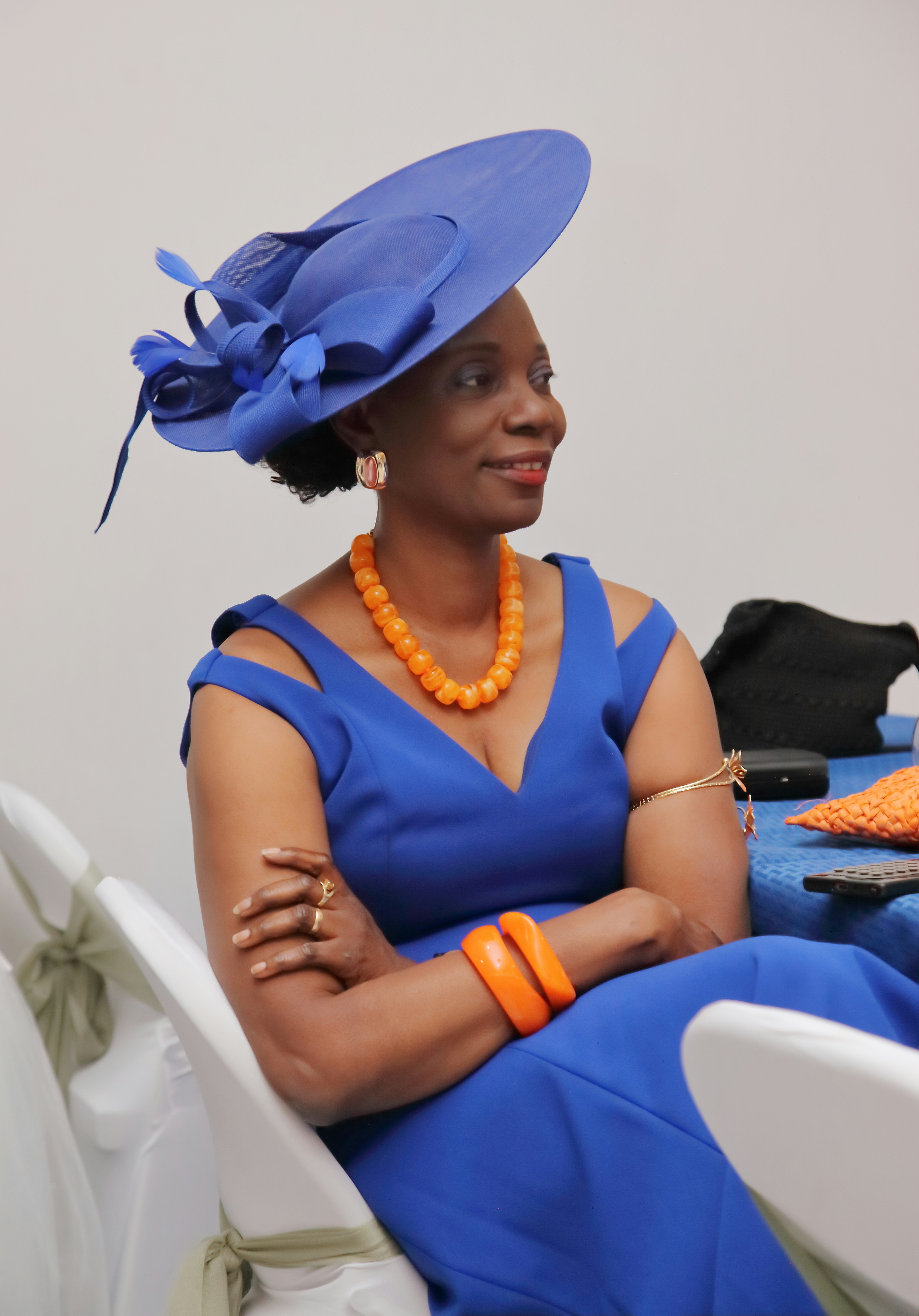Azure Elegance: Portrait of a Lady in a Bold Royal Ensemble