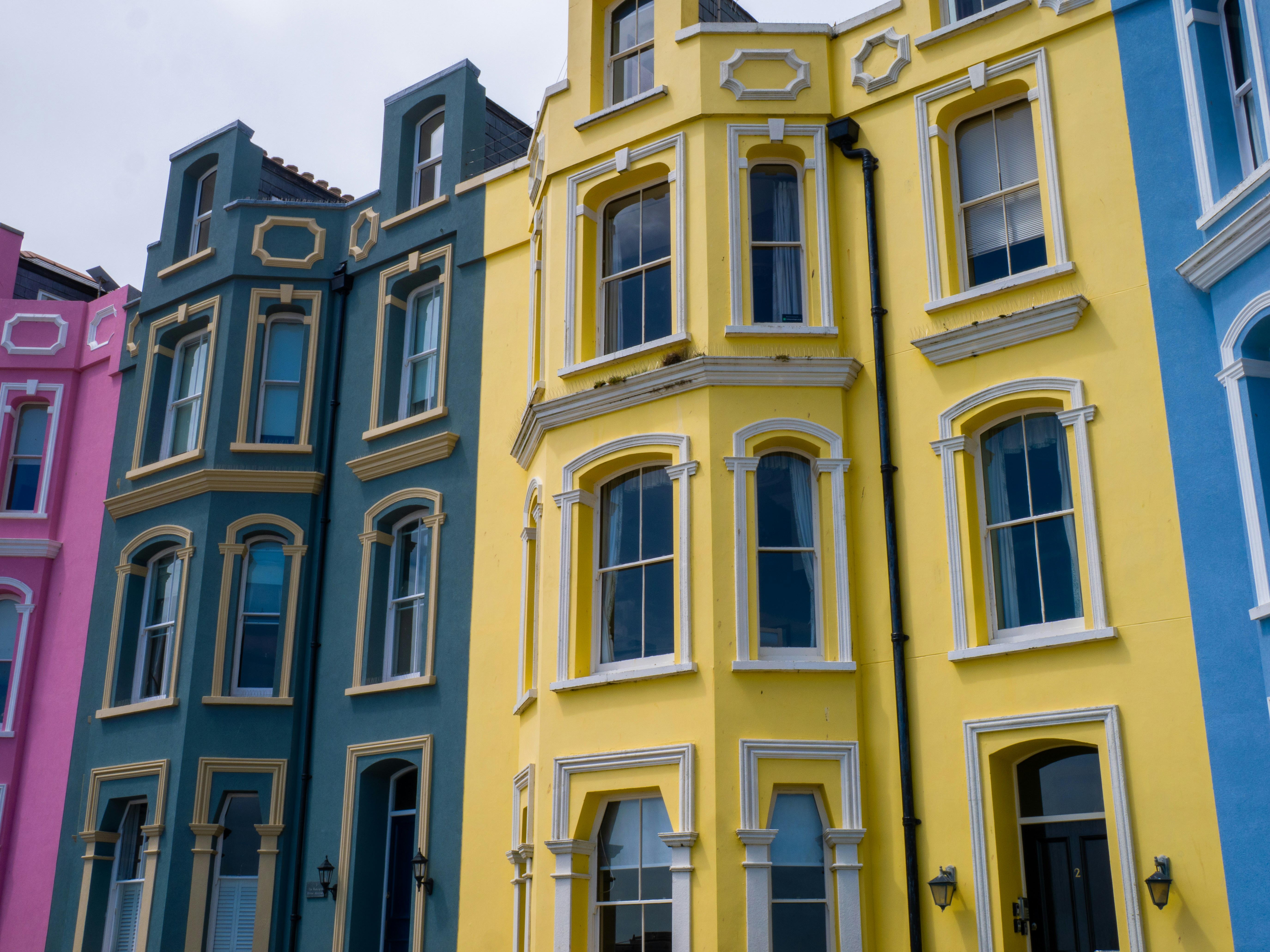 Colorful Row of Victorian Facades, Bright Yellow Centered