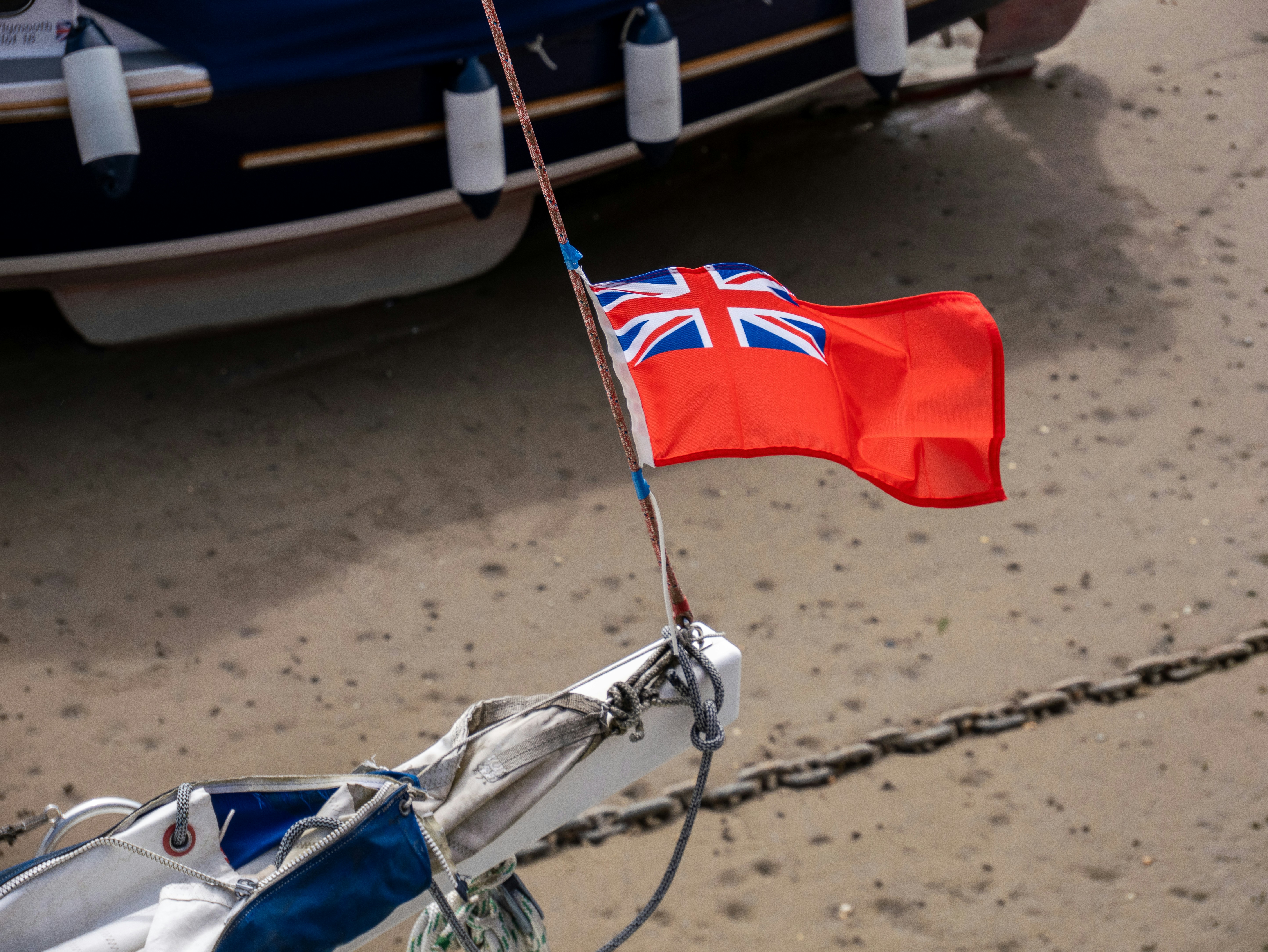 Red Ensign on a Mooring Line: A Quiet Harbour Detail
