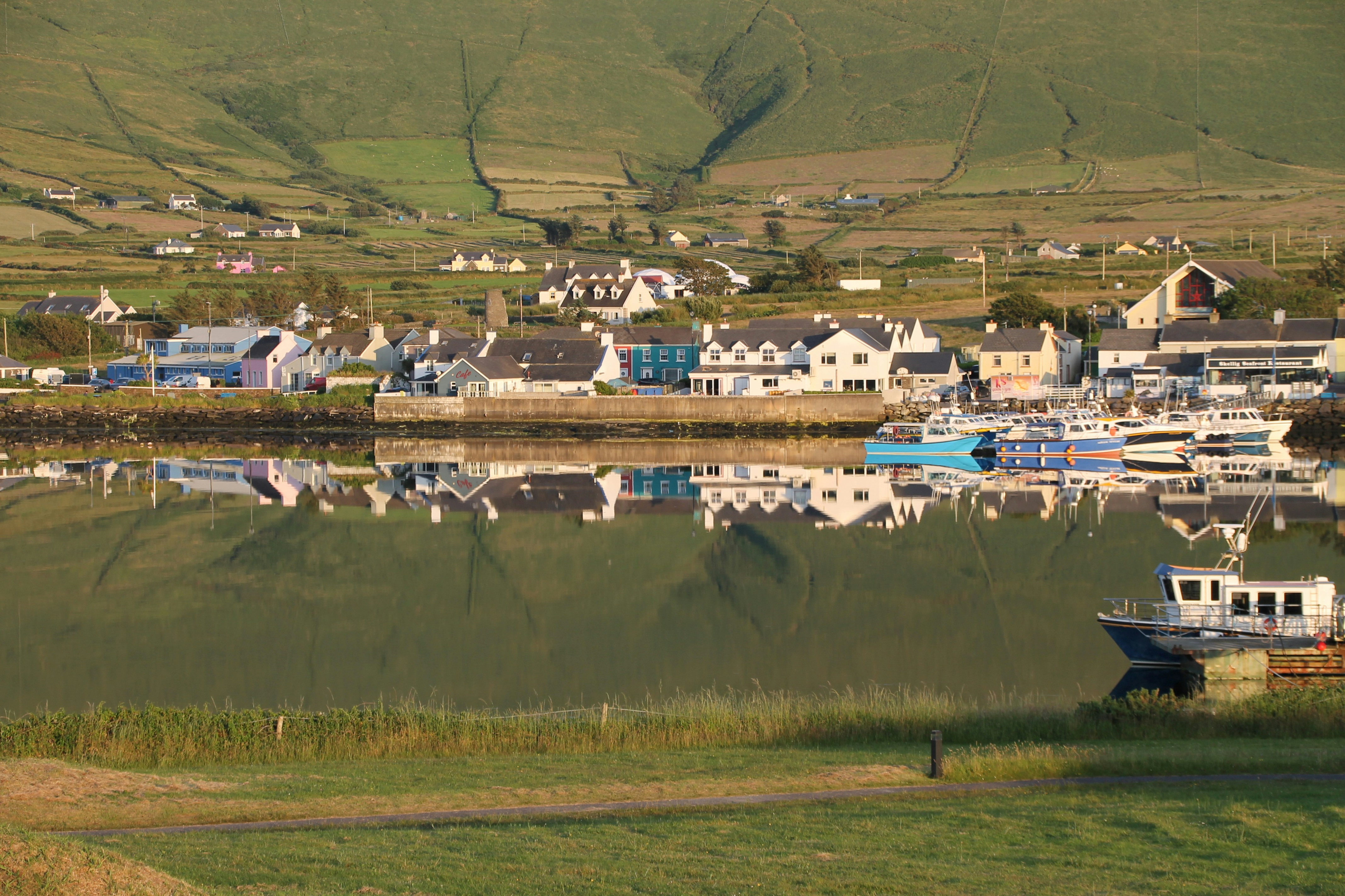 Quaint Coastal Village Reflected in Tranquil Waters