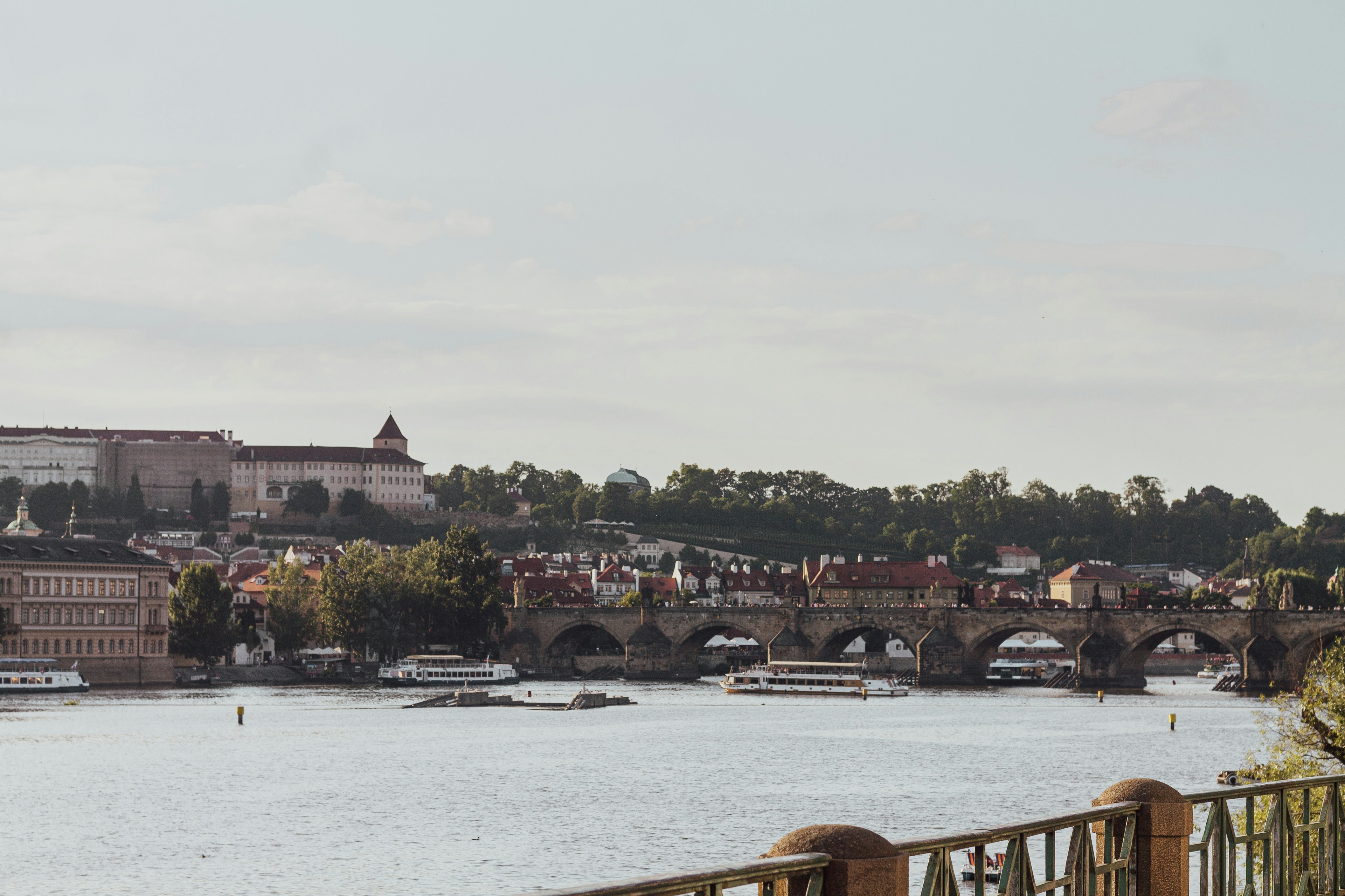 Riverfront Arcades: a quiet cityscape beneath the historic bridge