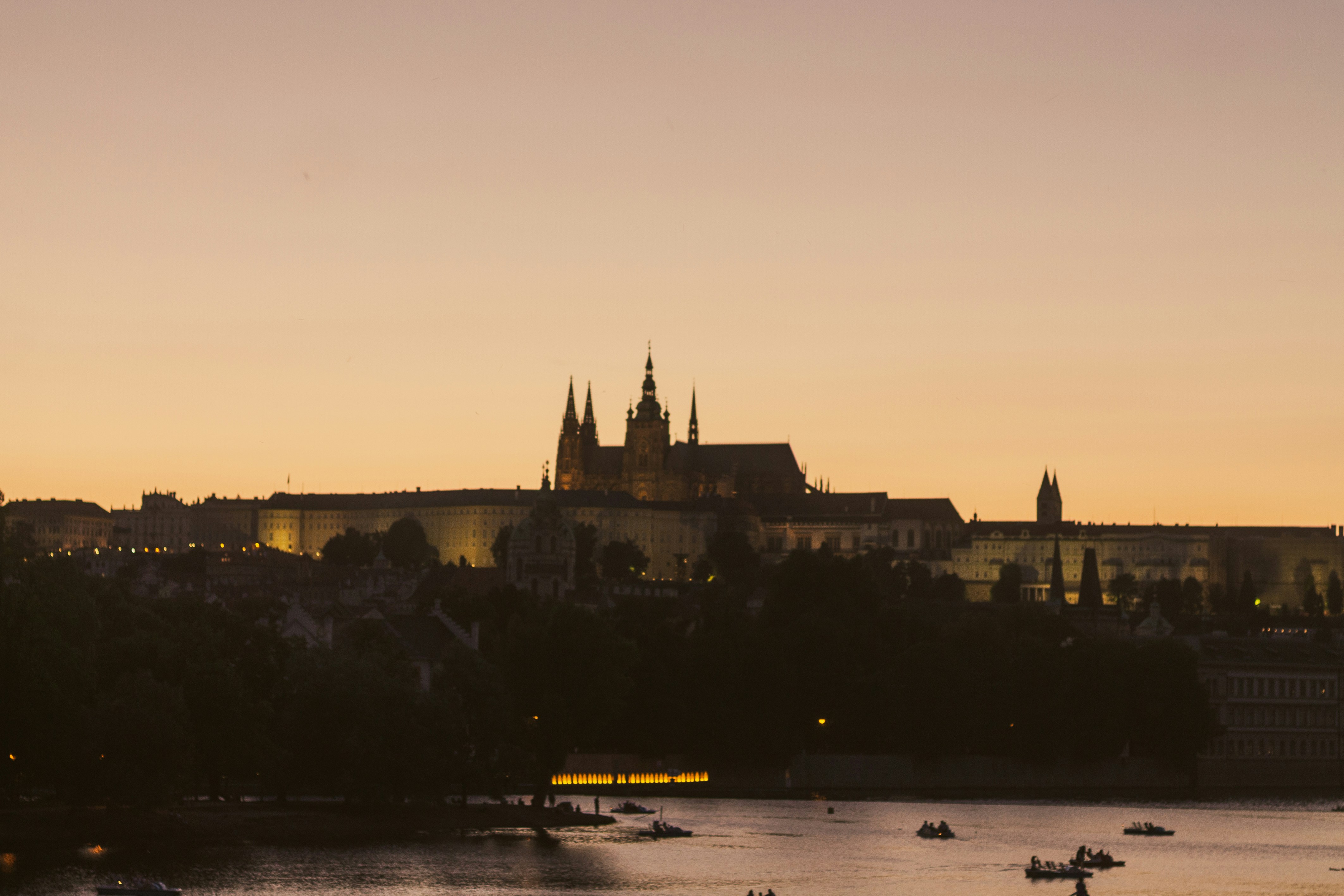 Twilight Citadel: A Silhouette Over the River at Dusk