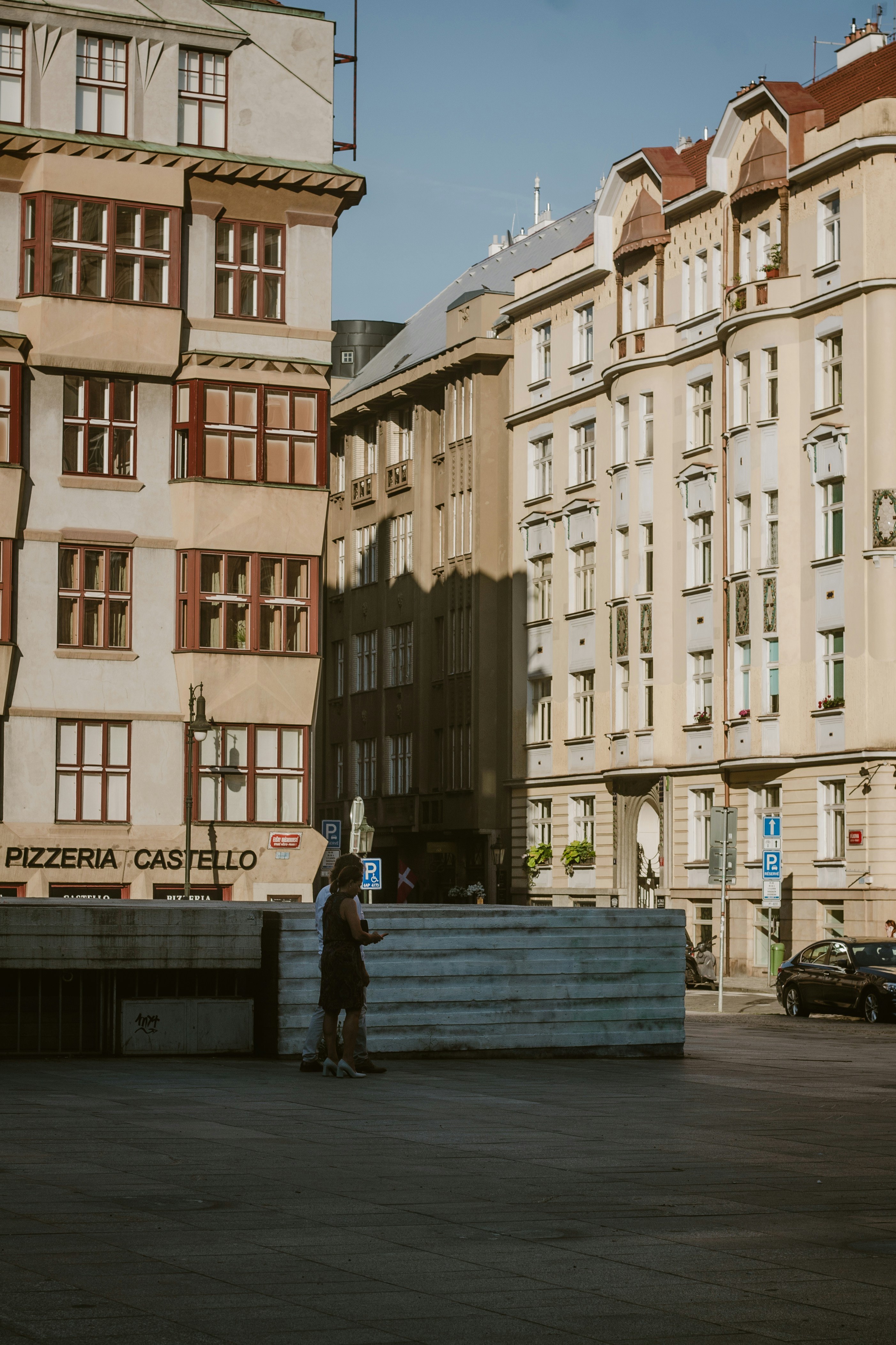 Sunlit Facades and Quiet Street in Golden Afternoon