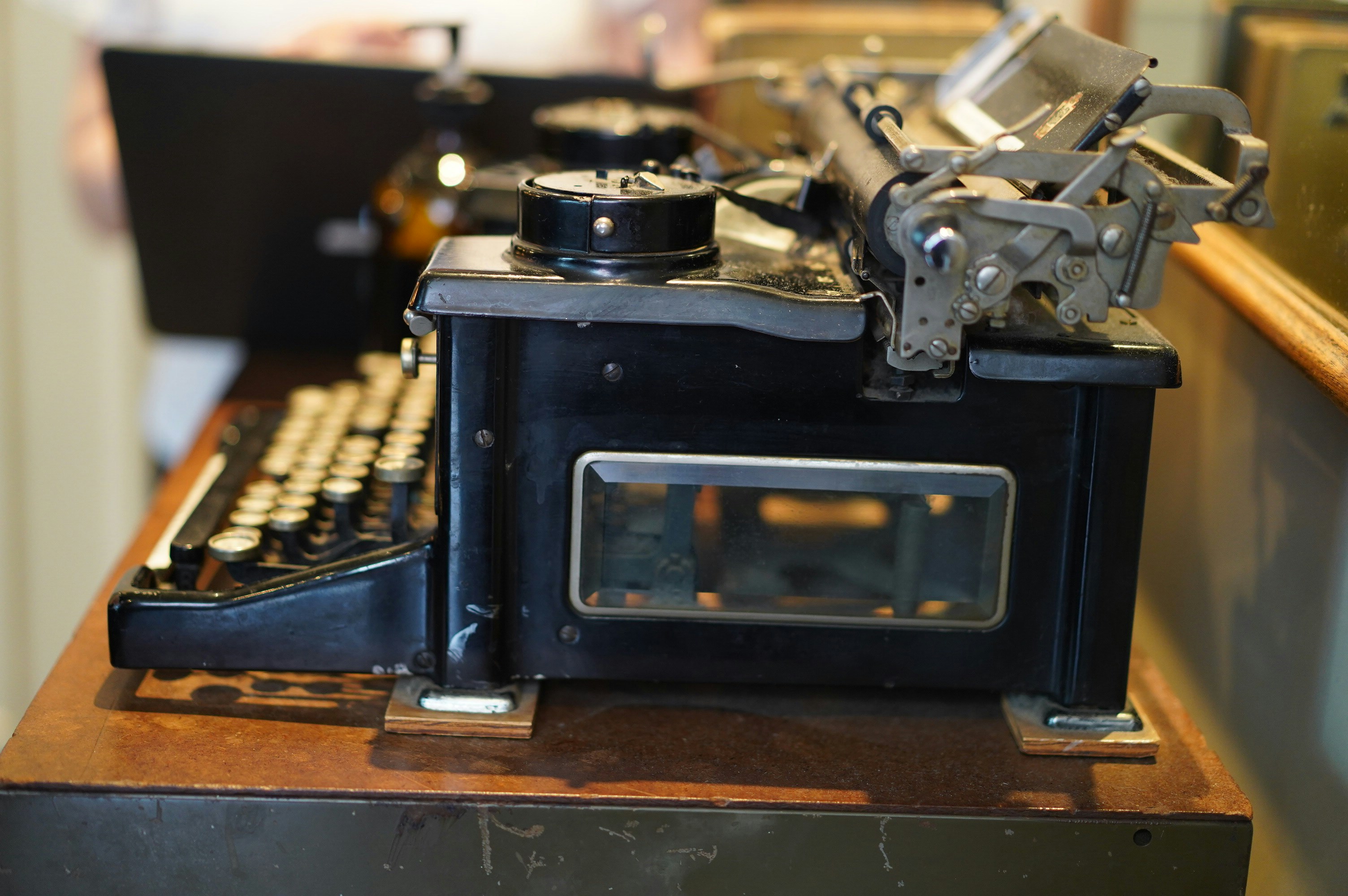 Voices from a bygone workshop: a vintage camera sits awaiting another roll