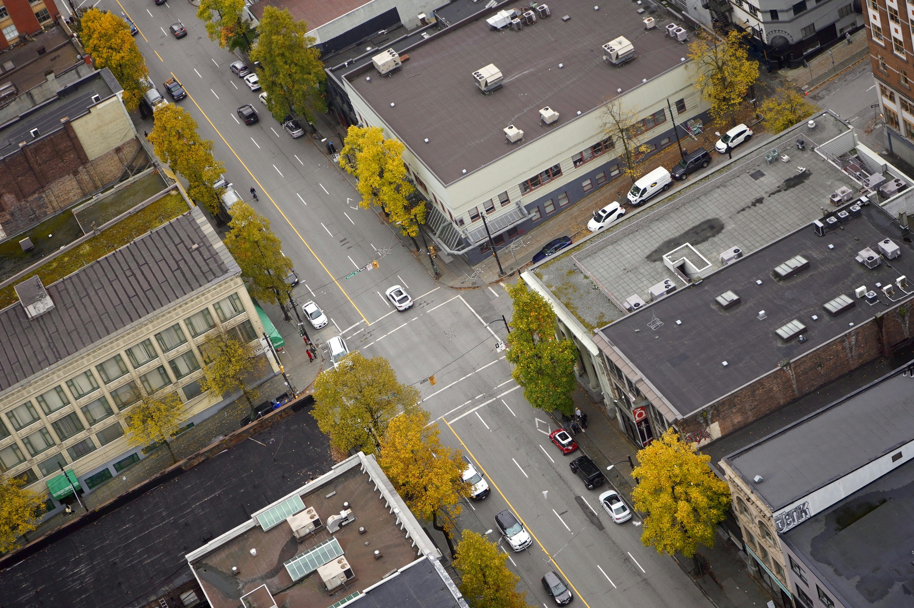 Aerial Grid: Autumn Traffic at a City Crossroads