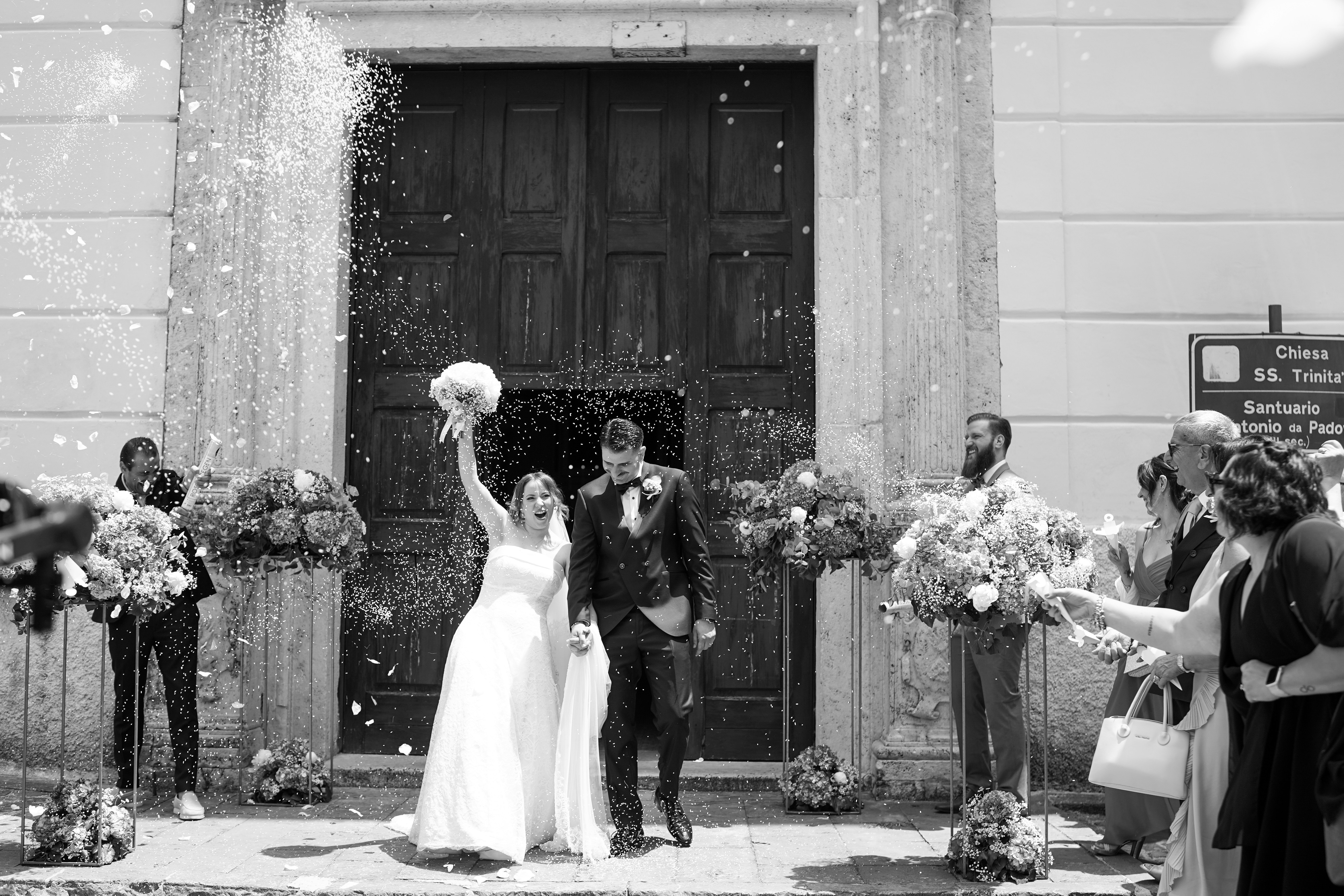 Bridal Exit Under Confetti: A Moment of Celebration at the Steps