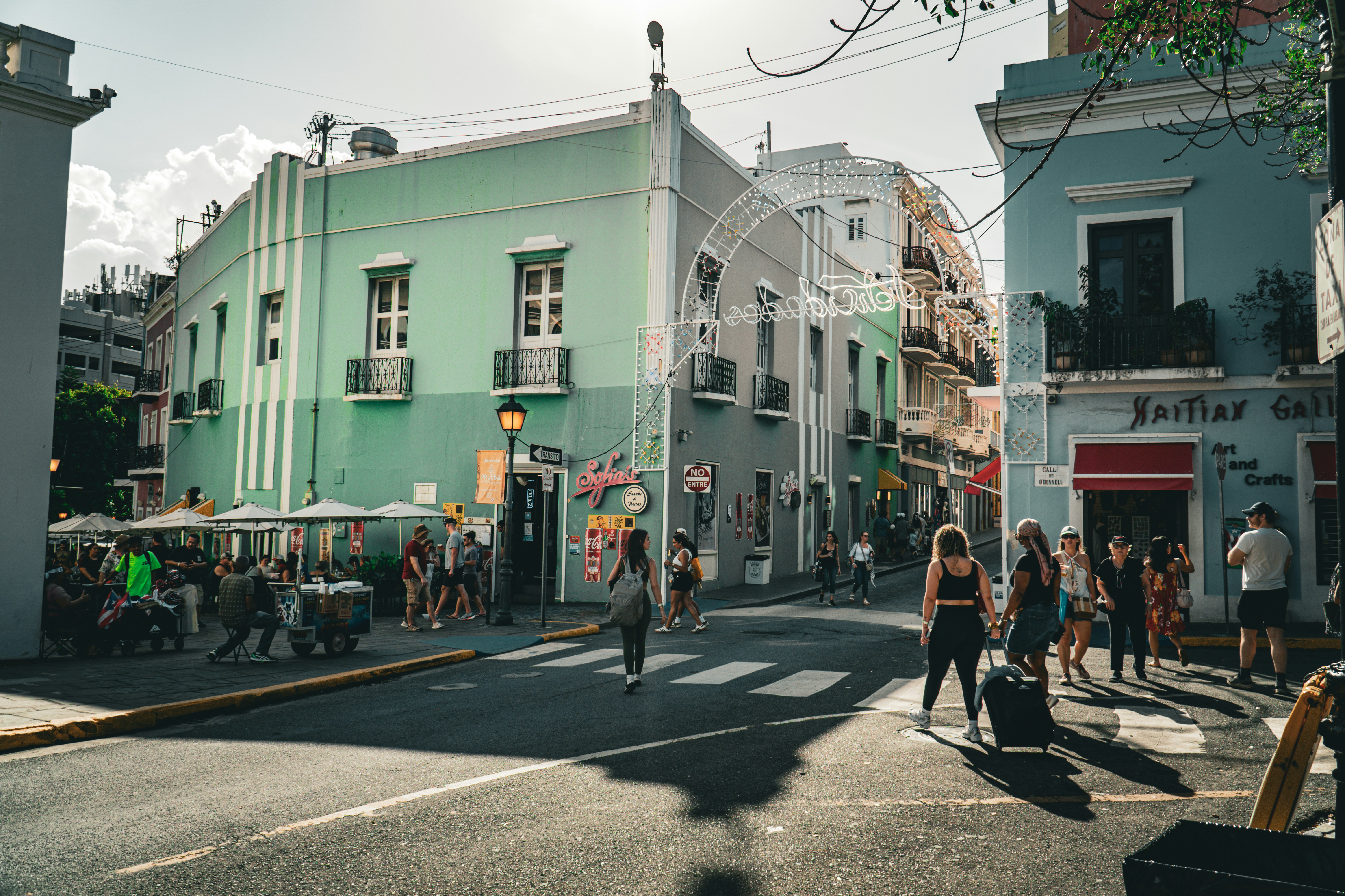 Sunlit Street Crossing Through a Colorful Colonial Quarter